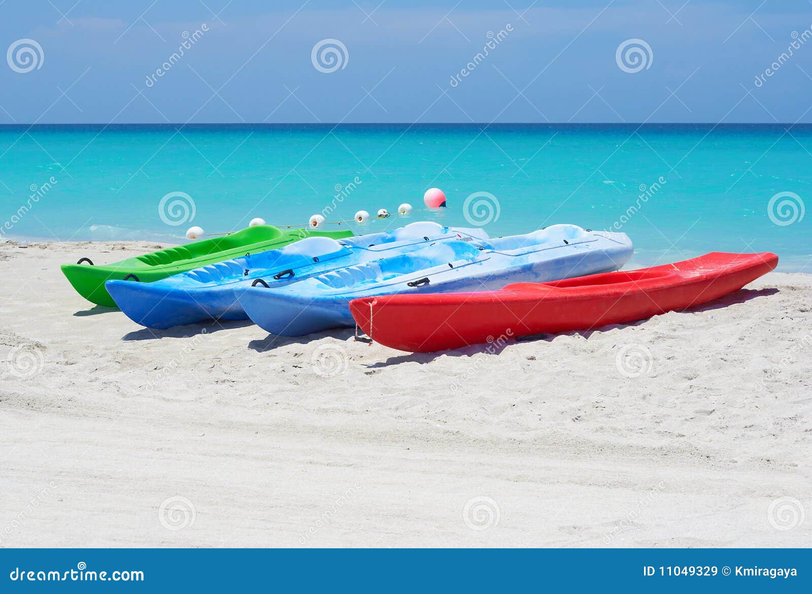 Group of kayaks in a beach stock image. Image of equipment - 11049329