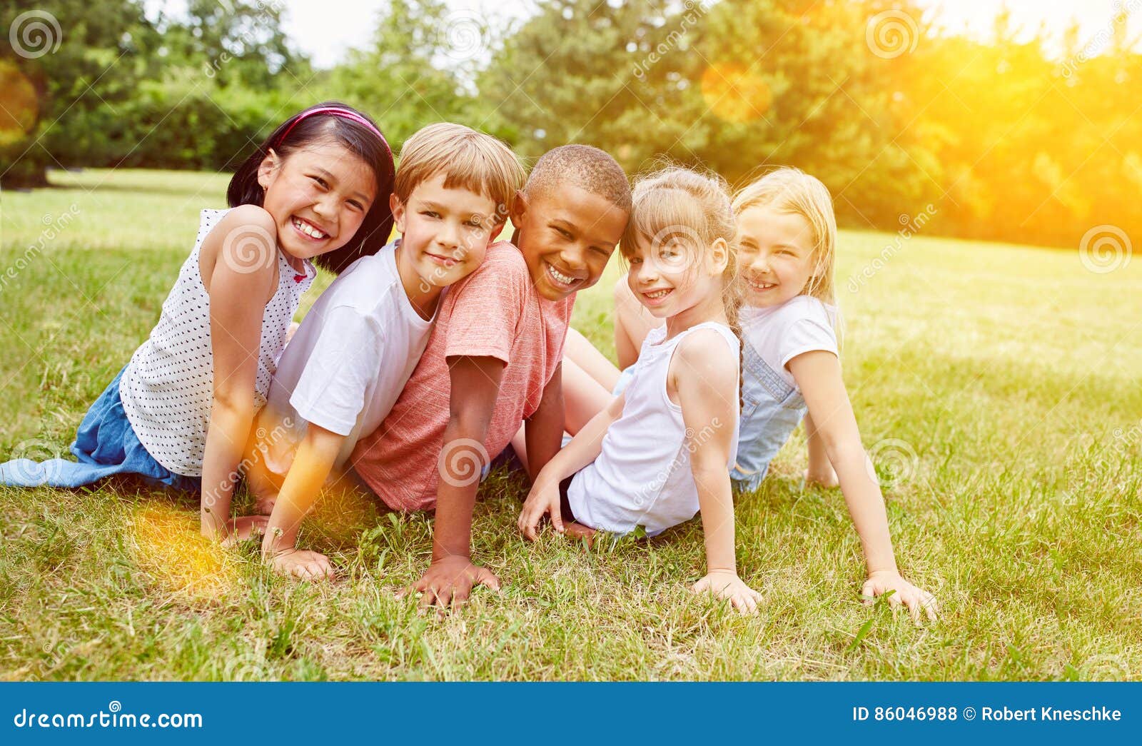 Group of Kids Have Fun in Summer in Meadow Stock Photo - Image of ...