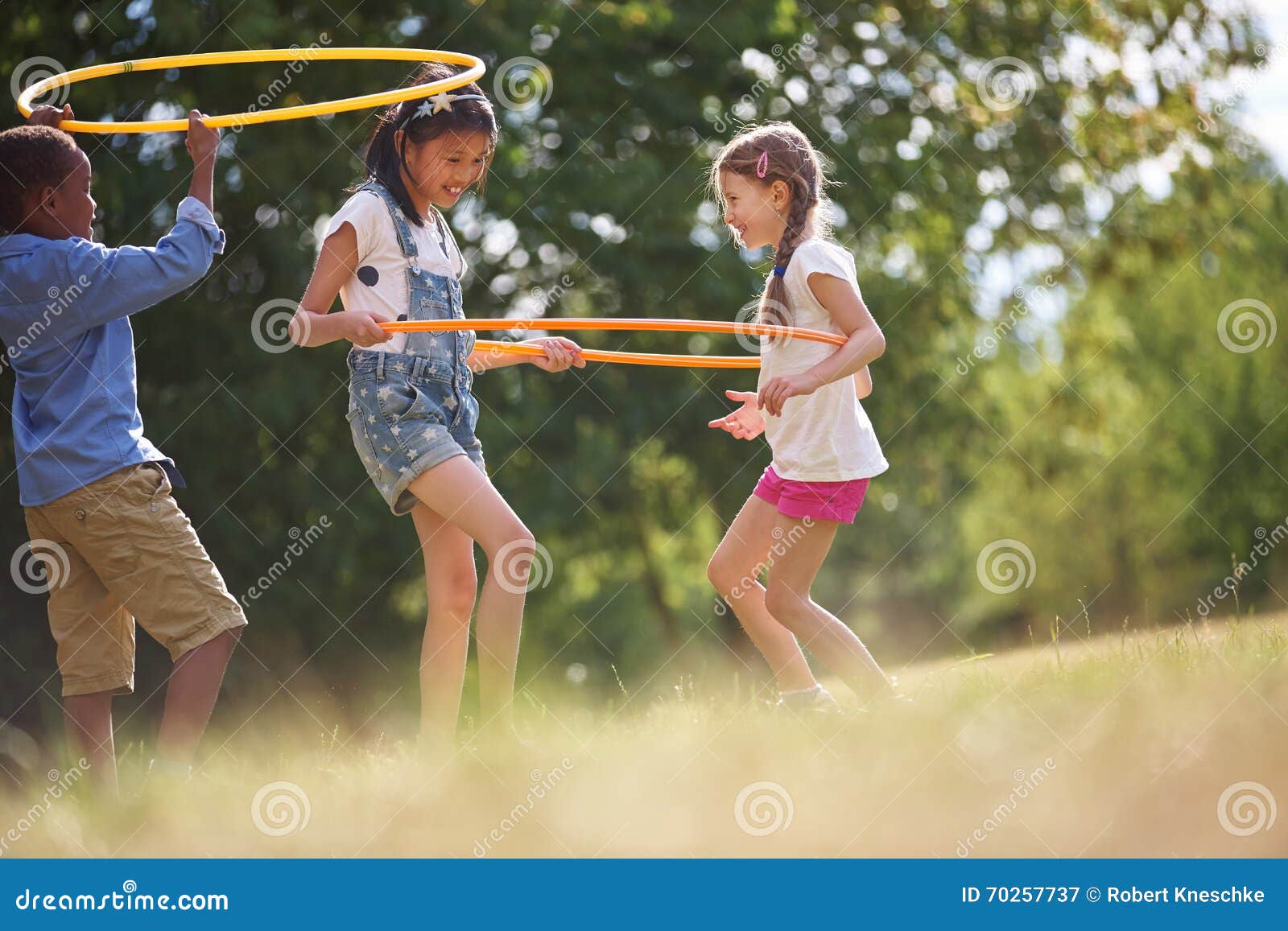 Group of Kids with Hula Hoop Stock Image - Image of round, young: 70257737