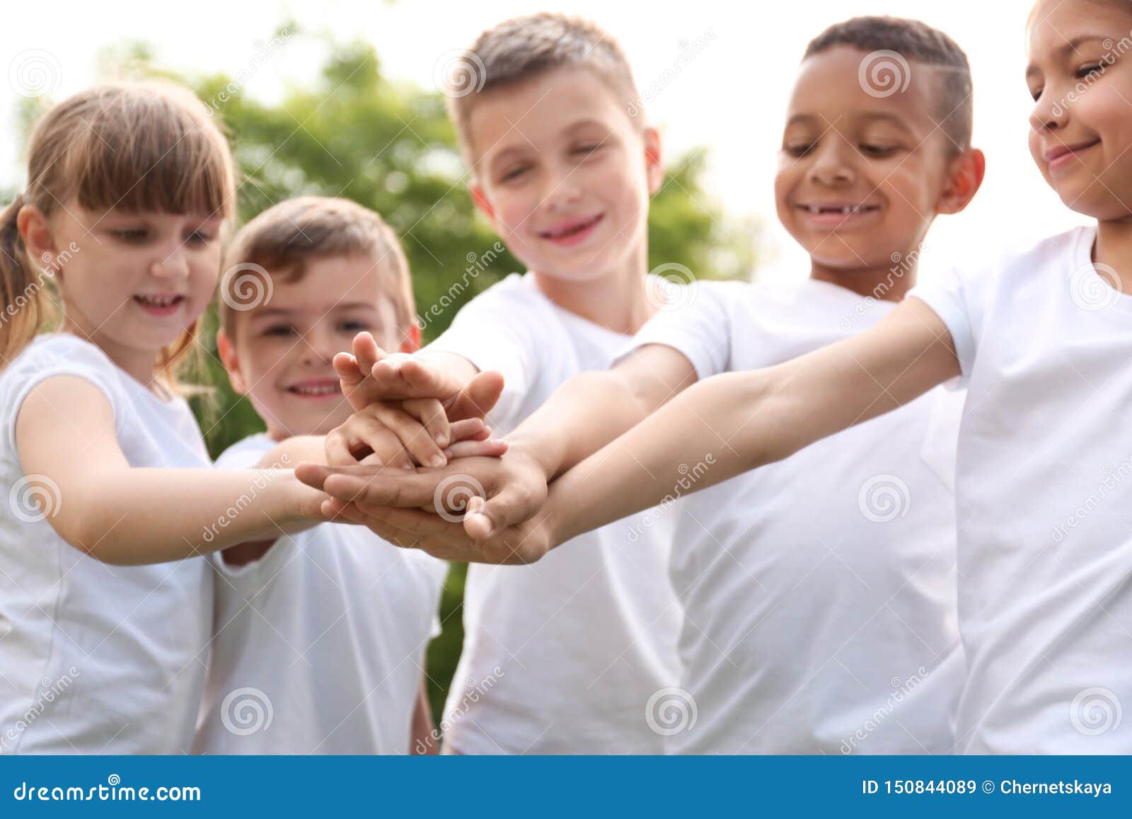 Group of Kids Joining Hands. Volunteer Project Stock Image - Image of ...