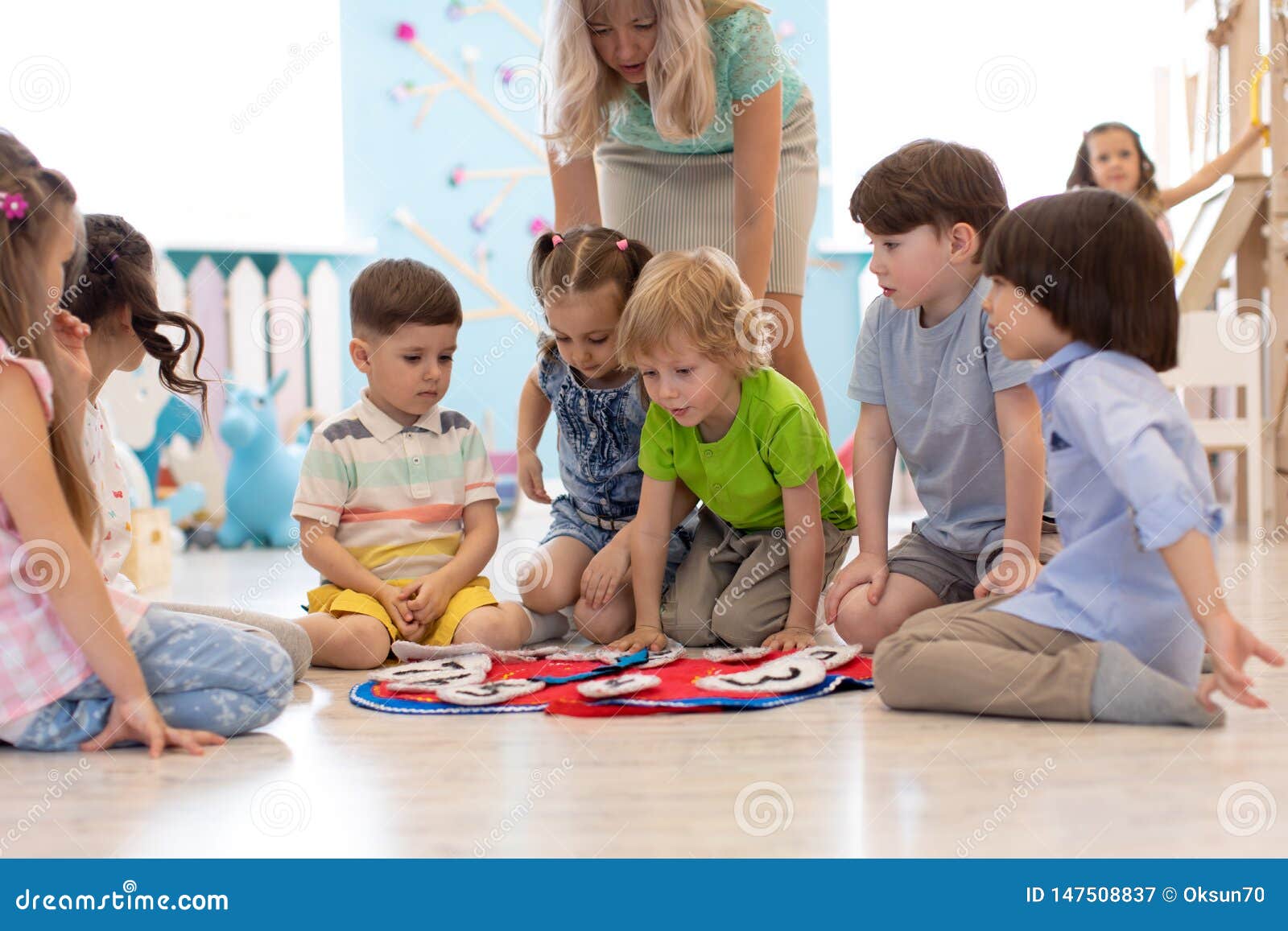 Group of Kids Learning Time with Clock Toy Stock Image - Image of ...