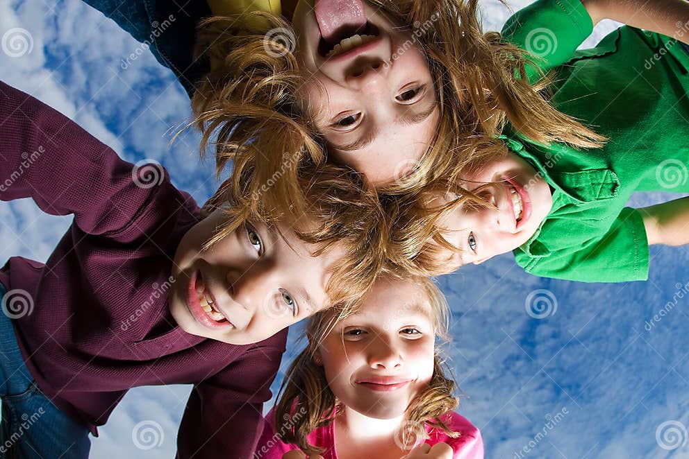 Group of kids looking down stock image. Image of happy - 21979915