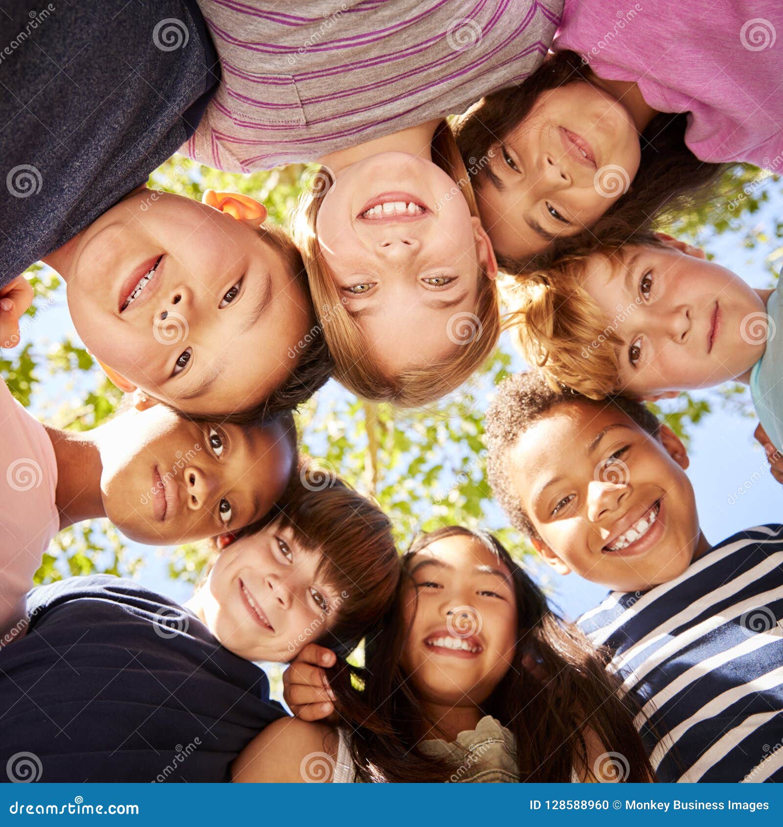 Group of Kids Outdoors Looking Down at Camera, Square Format Stock ...