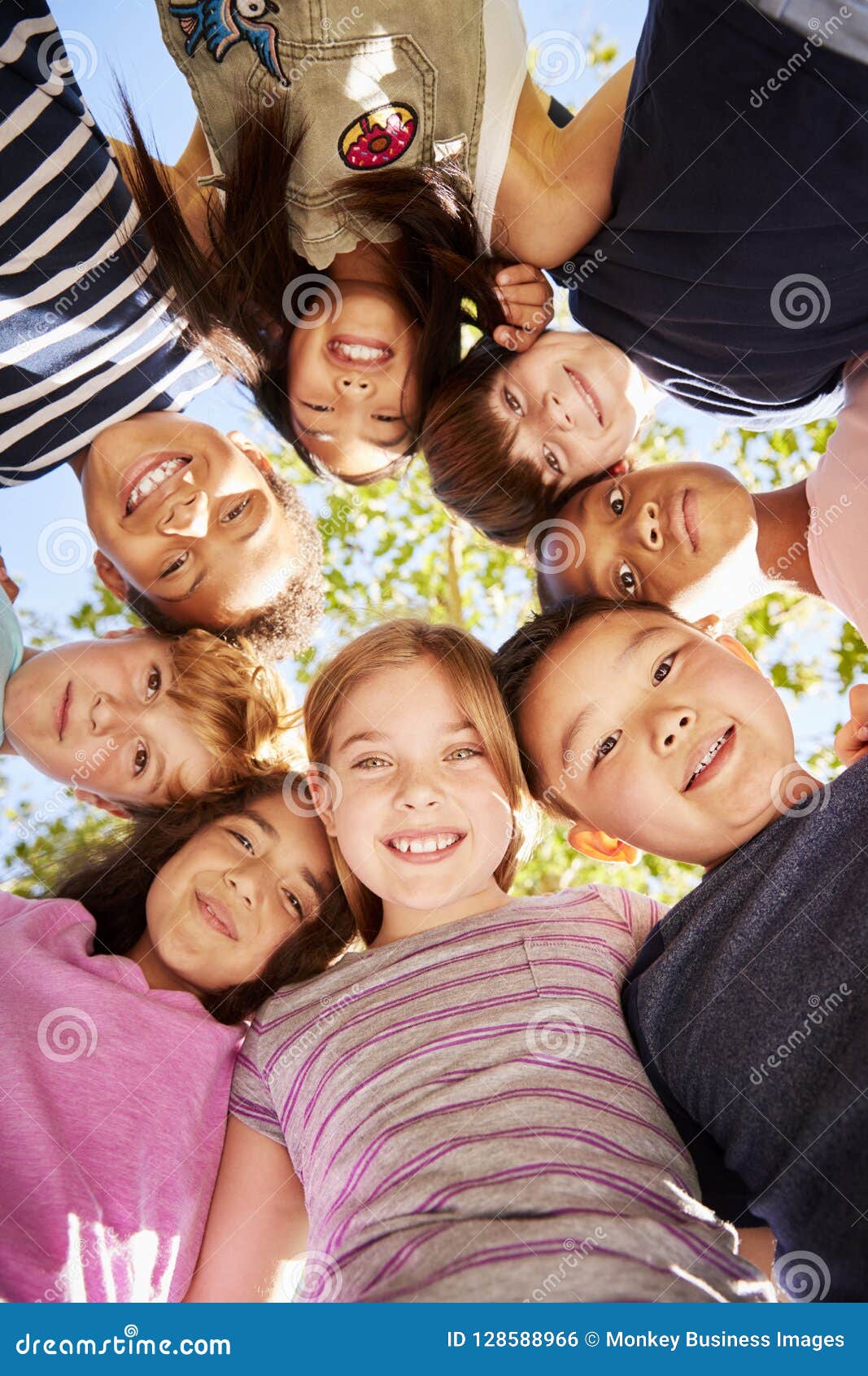 Group of Kids Outdoors Looking Down at Camera,verticle Stock Photo ...