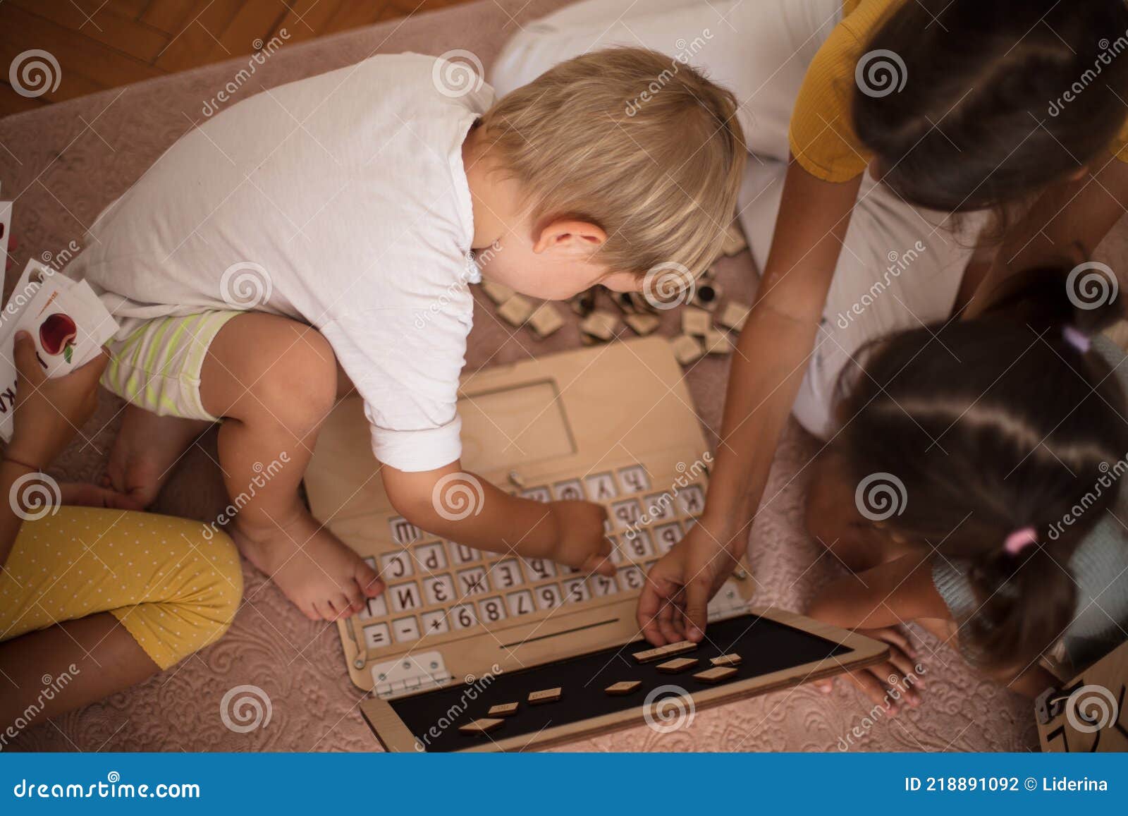Group of Kids Playing Interactive Games Stock Photo - Image of females ...