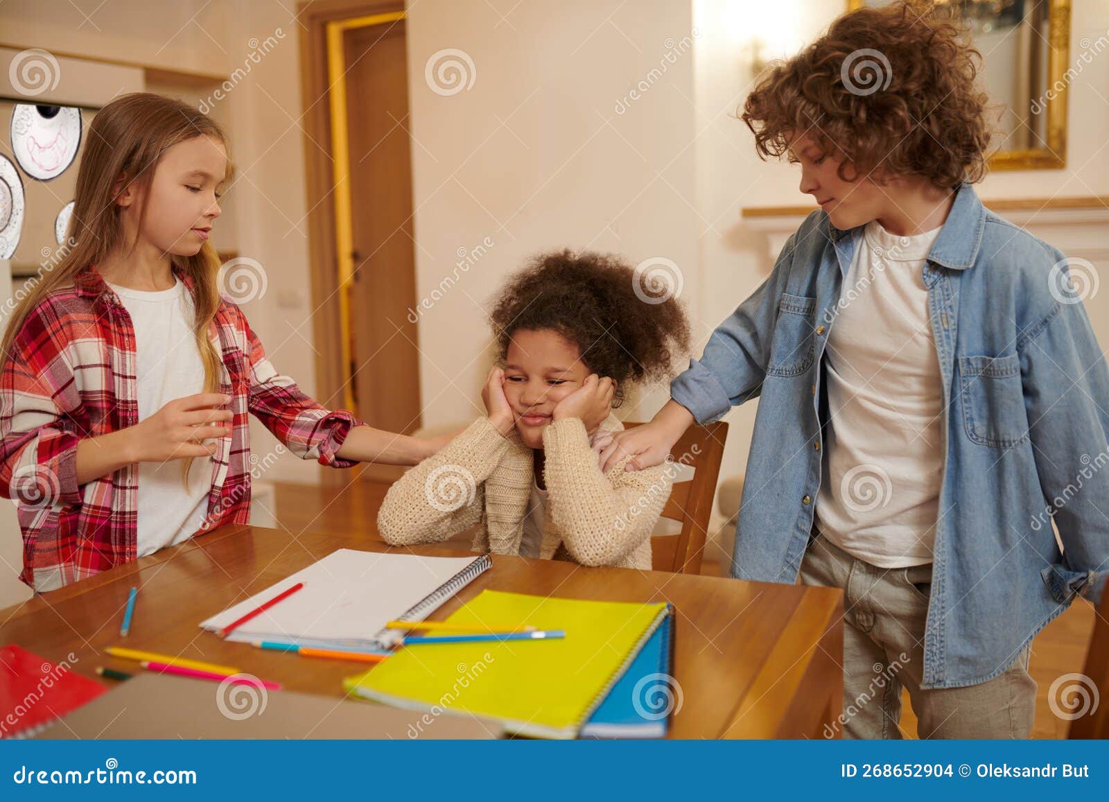 A Group of Kids Preparing Home Work Together and Helping the Classmate ...
