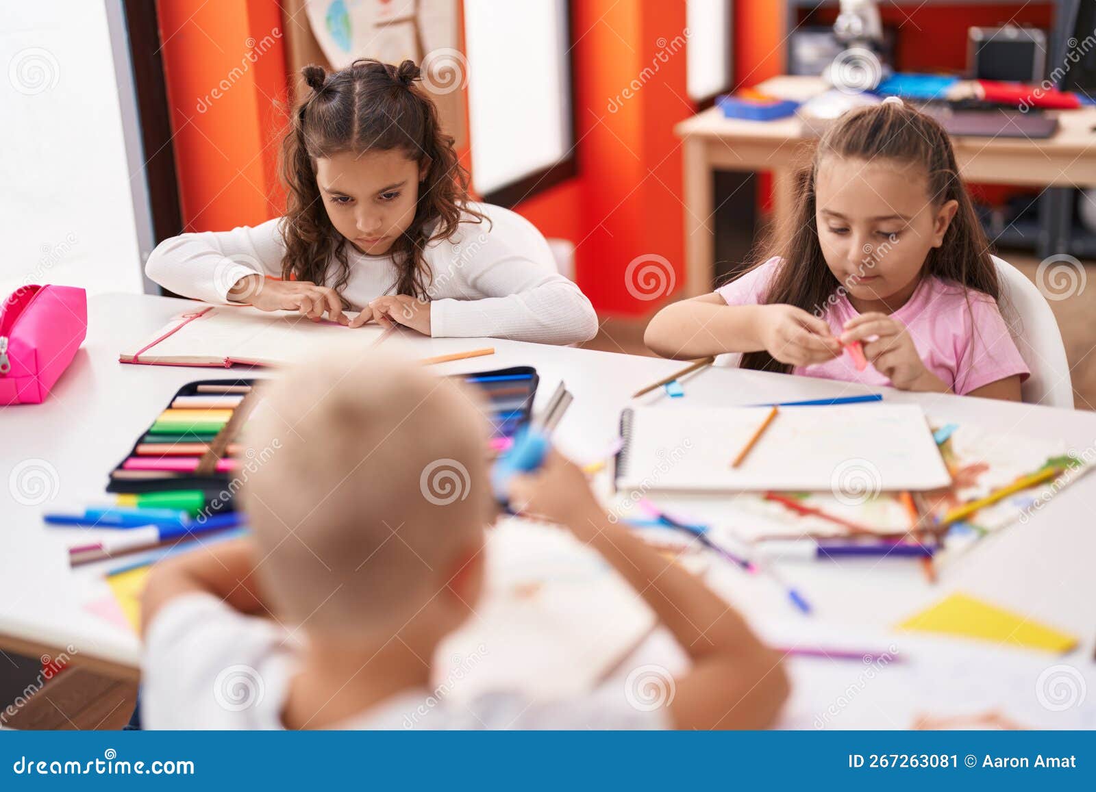 Group of Kids Preschool Students Sitting on Table Drawing on Paper at ...