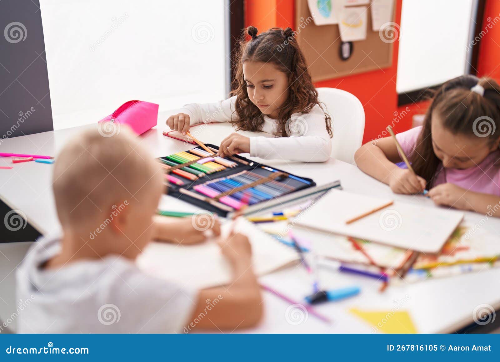Group of Kids Preschool Students Sitting on Table Drawing on Paper at ...