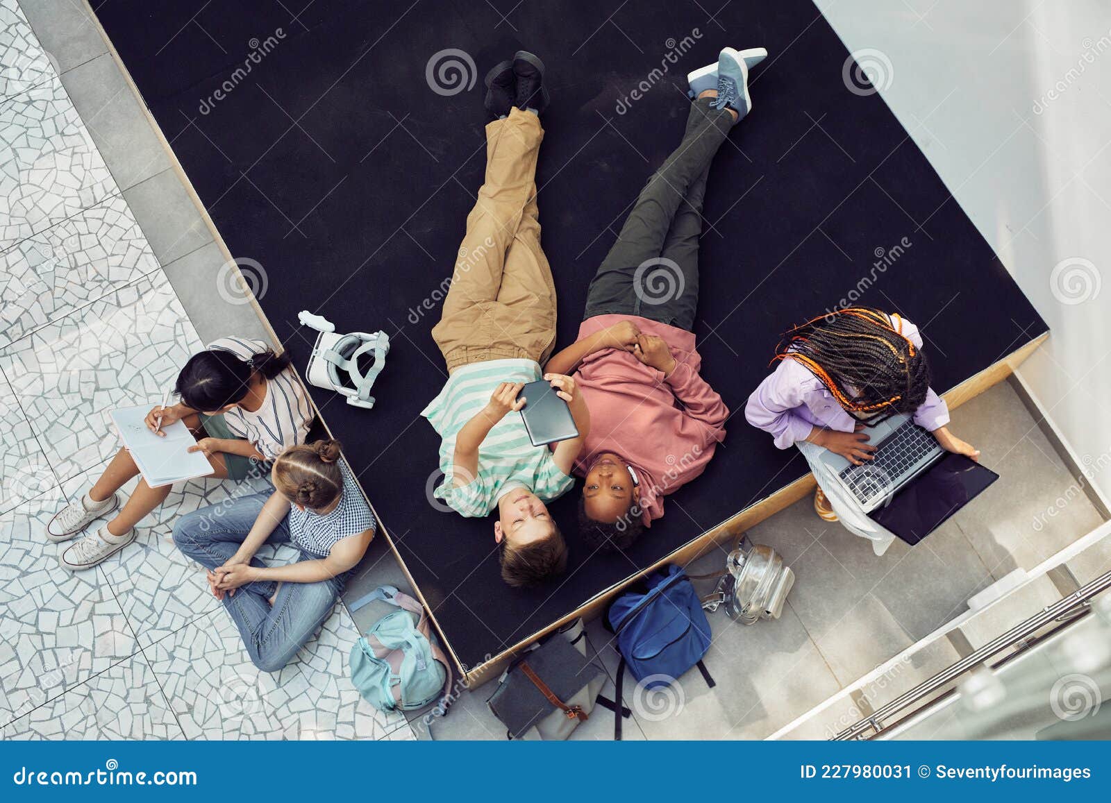 Group of Kids Relaxing in School Lounge Stock Image - Image of teamwork ...