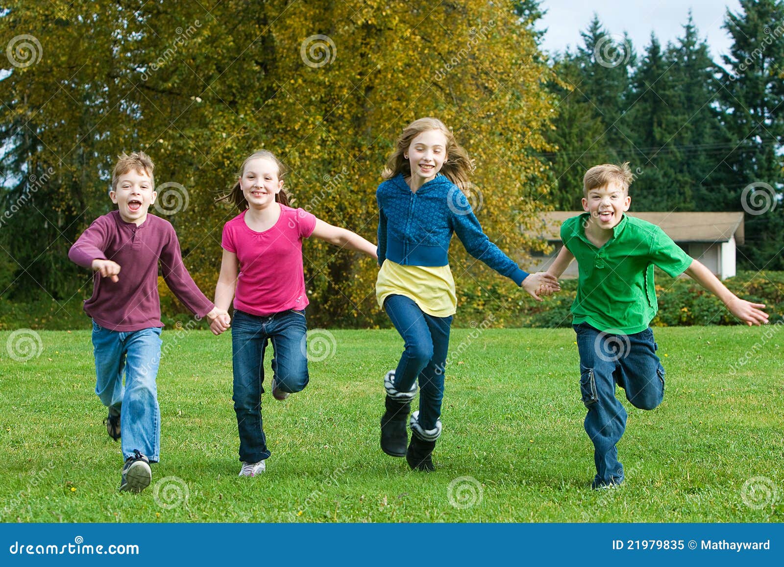 A Group of Kids Running in Grass Stock Image - Image of exercising ...