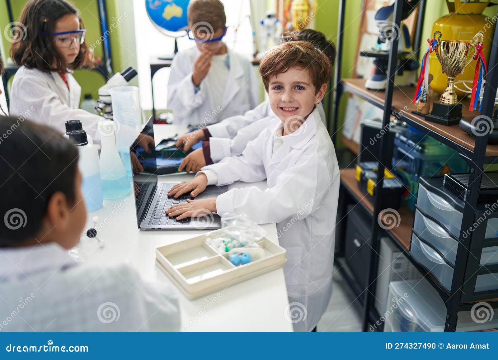 Group of Kids Scientists Students Using Laptop at Laboratory Classroom ...