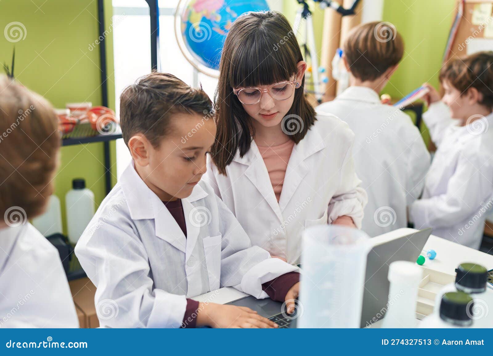 Group of Kids Scientists Students Using Laptop at Laboratory Classroom ...