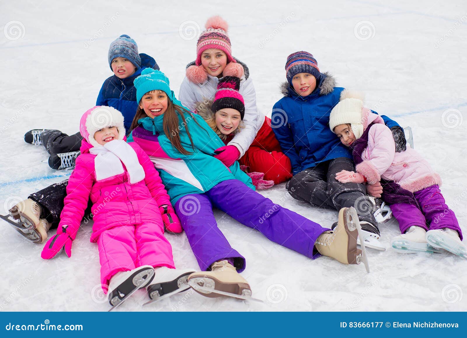 Group of Kids Sitting on the Ice Stock Image - Image of cheerful ...