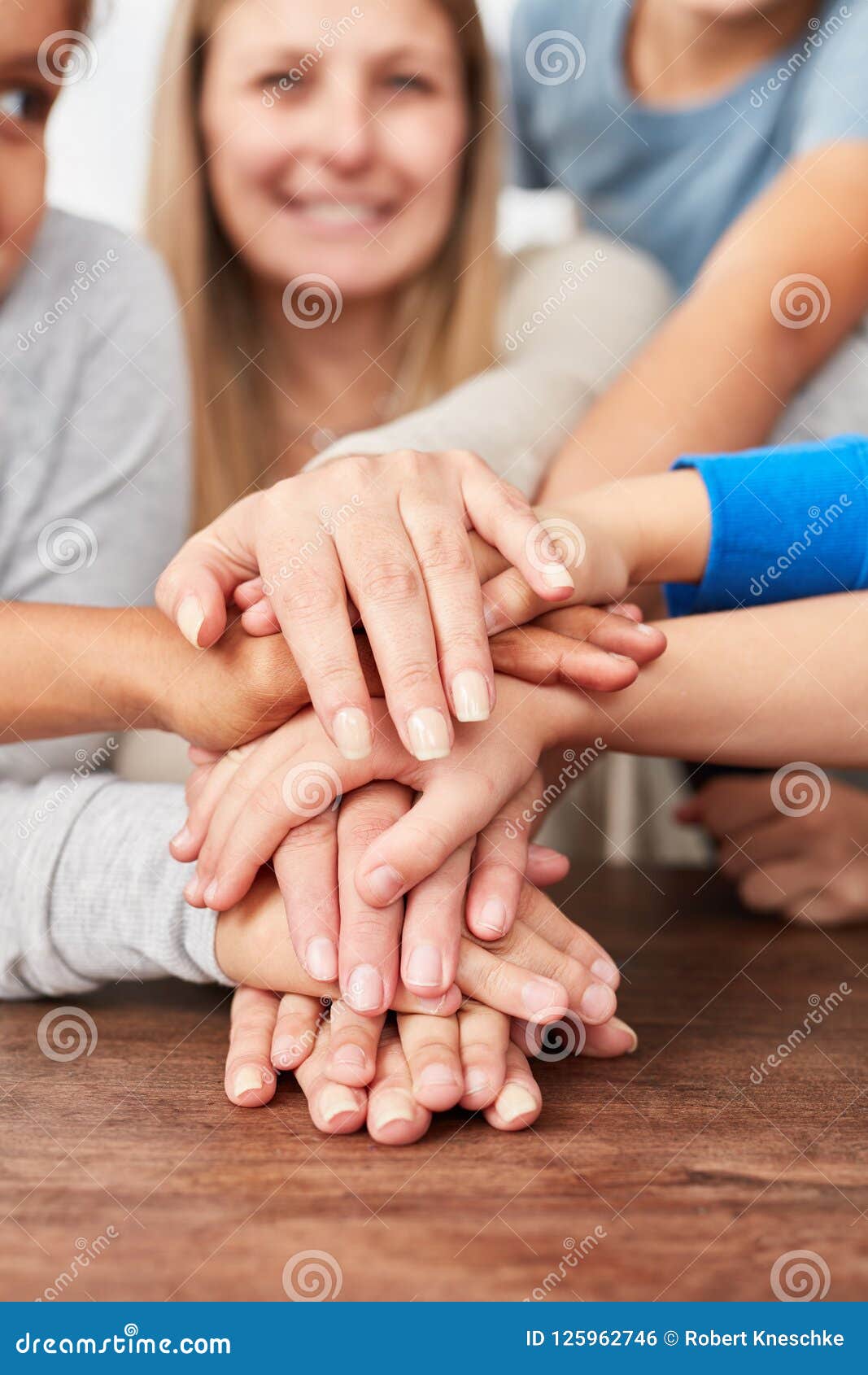 Group of Kids Stacks Hands for Cooperation Stock Photo - Image of ...