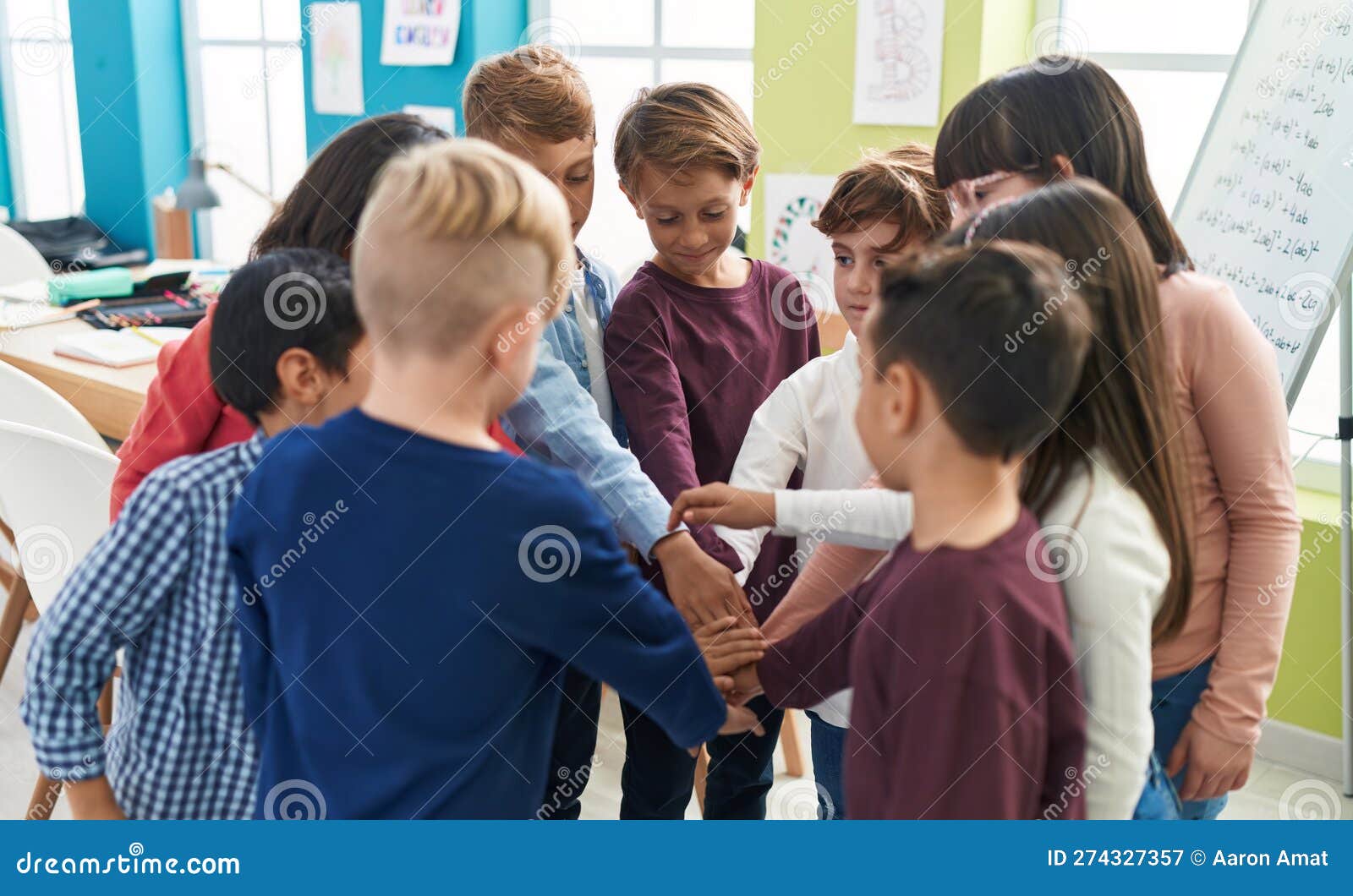 Group of Kids Students with Hands Together at Classroom Stock Image ...