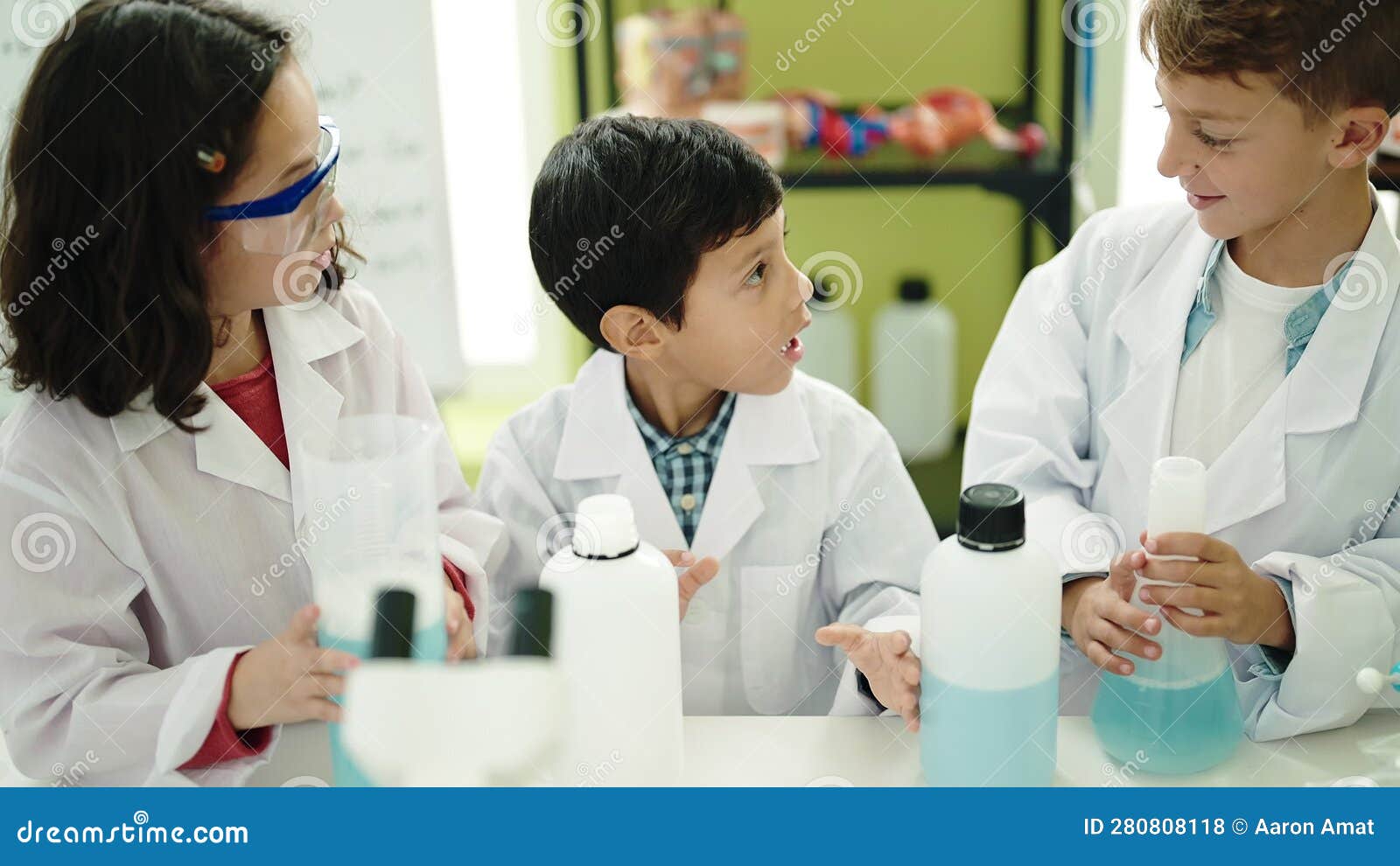Group of Kids Students Pouring Liquid on Bottl Doing Experiment at ...