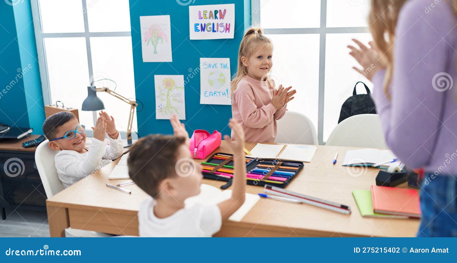 Group of Kids Students Sitting on Table Clapping Hands at Classroom ...