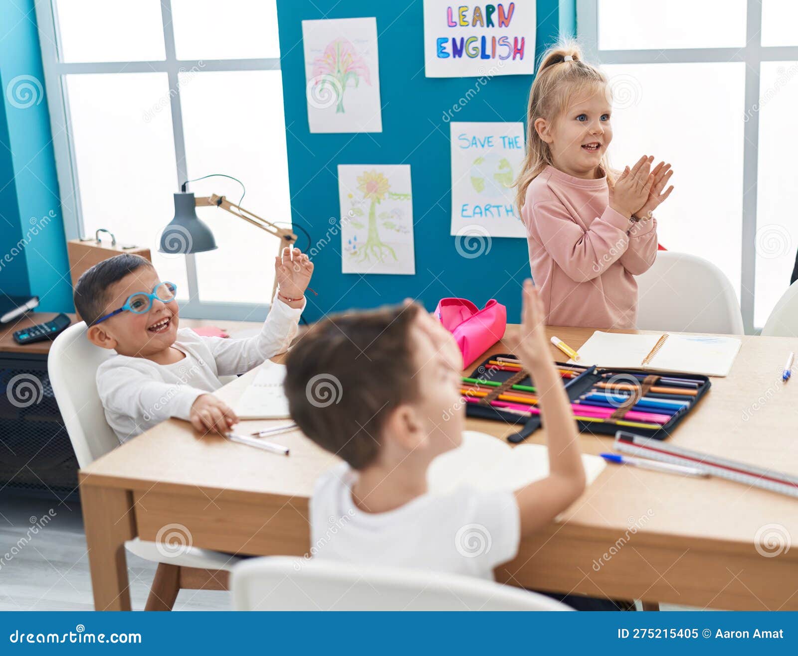 Group of Kids Students Sitting on Table Clapping Hands at Classroom ...