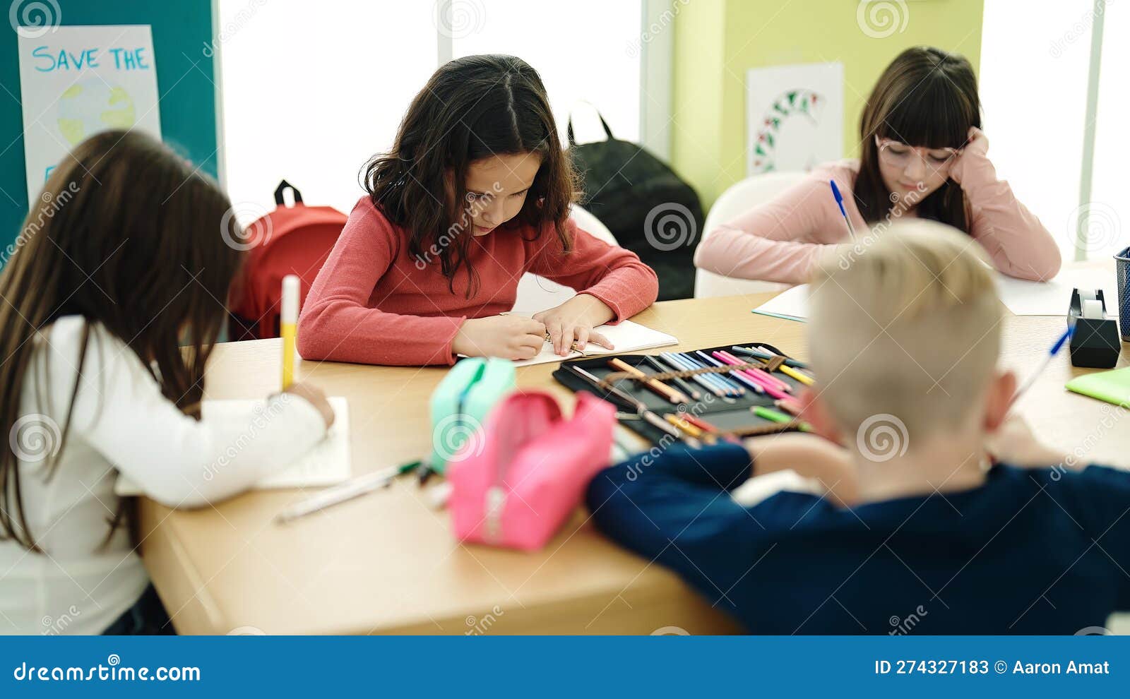 Group of Kids Students Sitting on Table Studying at Classroom Stock ...