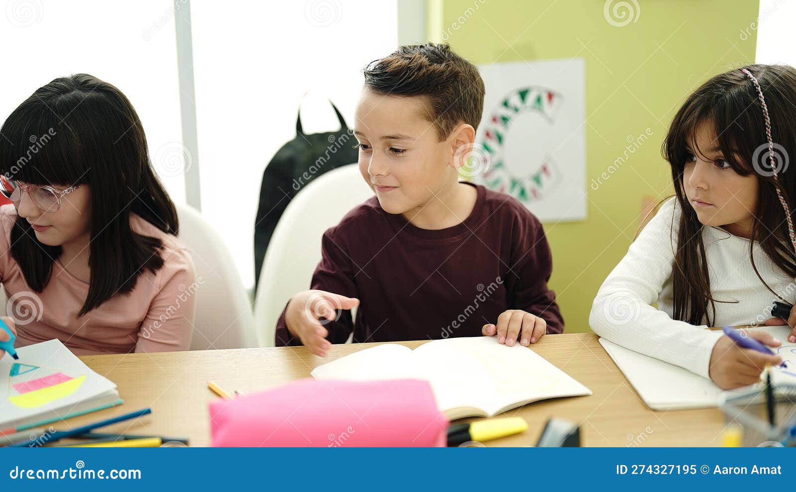 Group of Kids Students Sitting on Table Studying at Classroom Stock ...