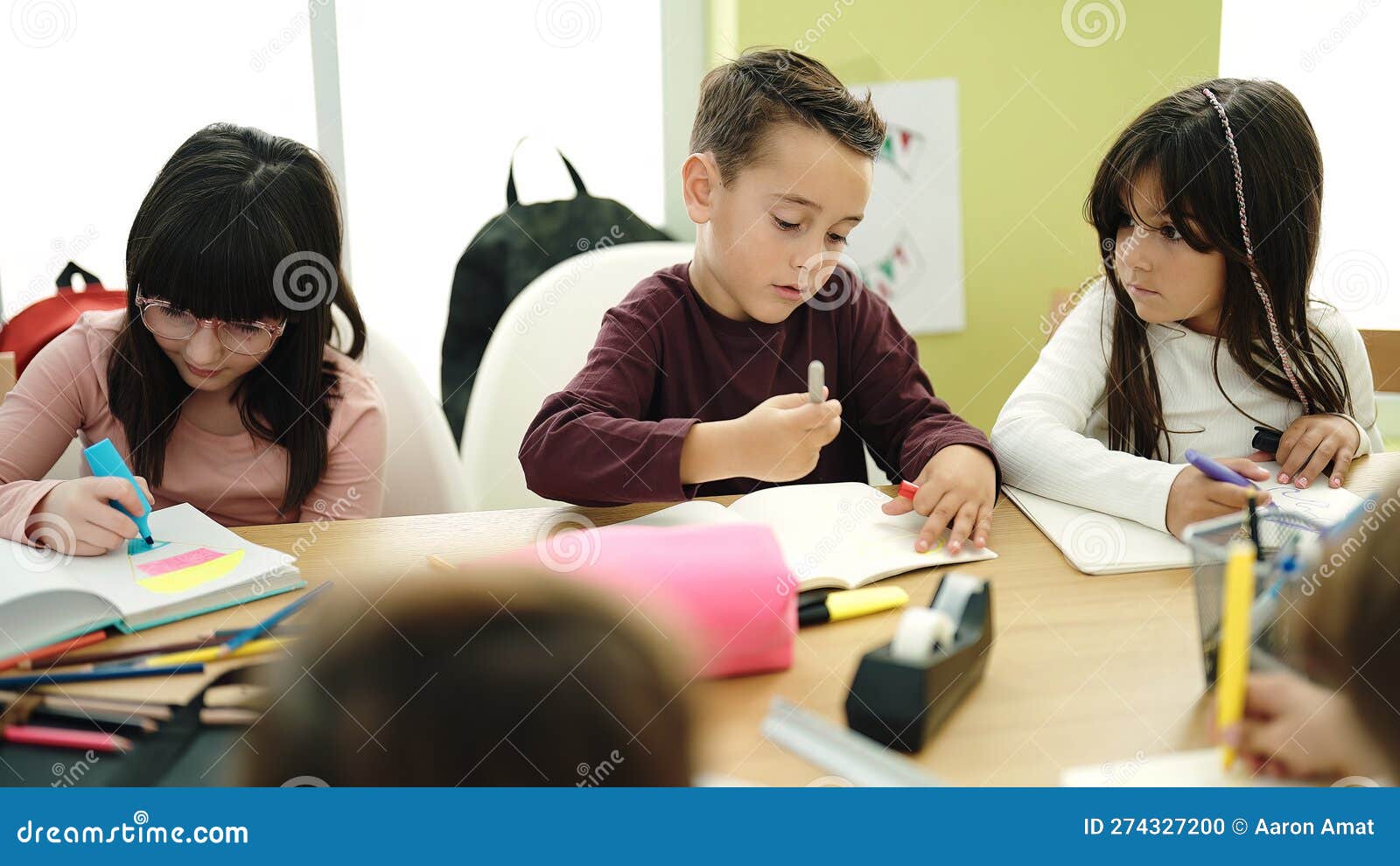 Group of Kids Students Sitting on Table Studying at Classroom Stock ...
