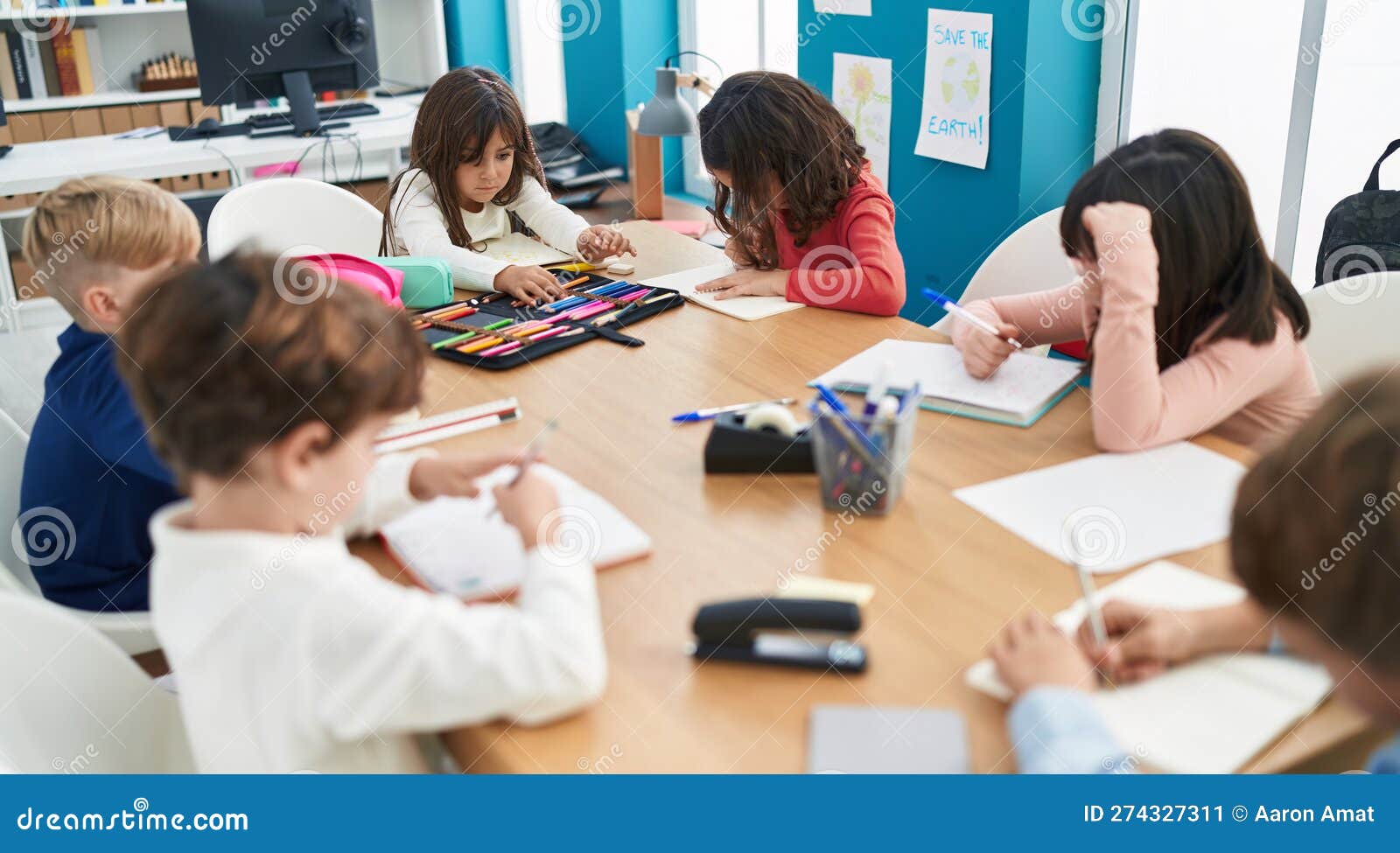 Group of Kids Students Sitting on Table Studying at Classroom Stock ...