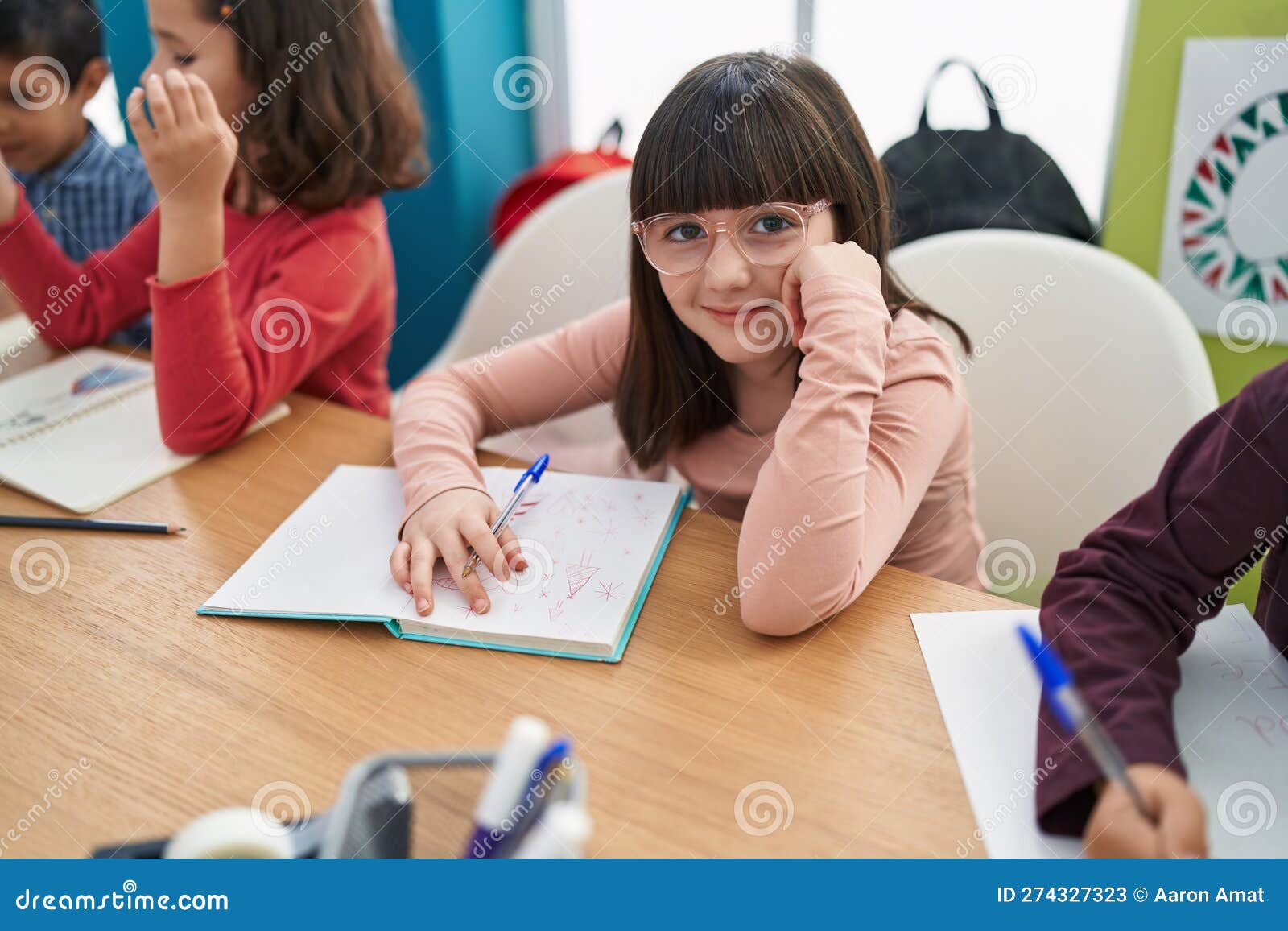 Group of Kids Students Sitting on Table Studying at Classroom Stock ...