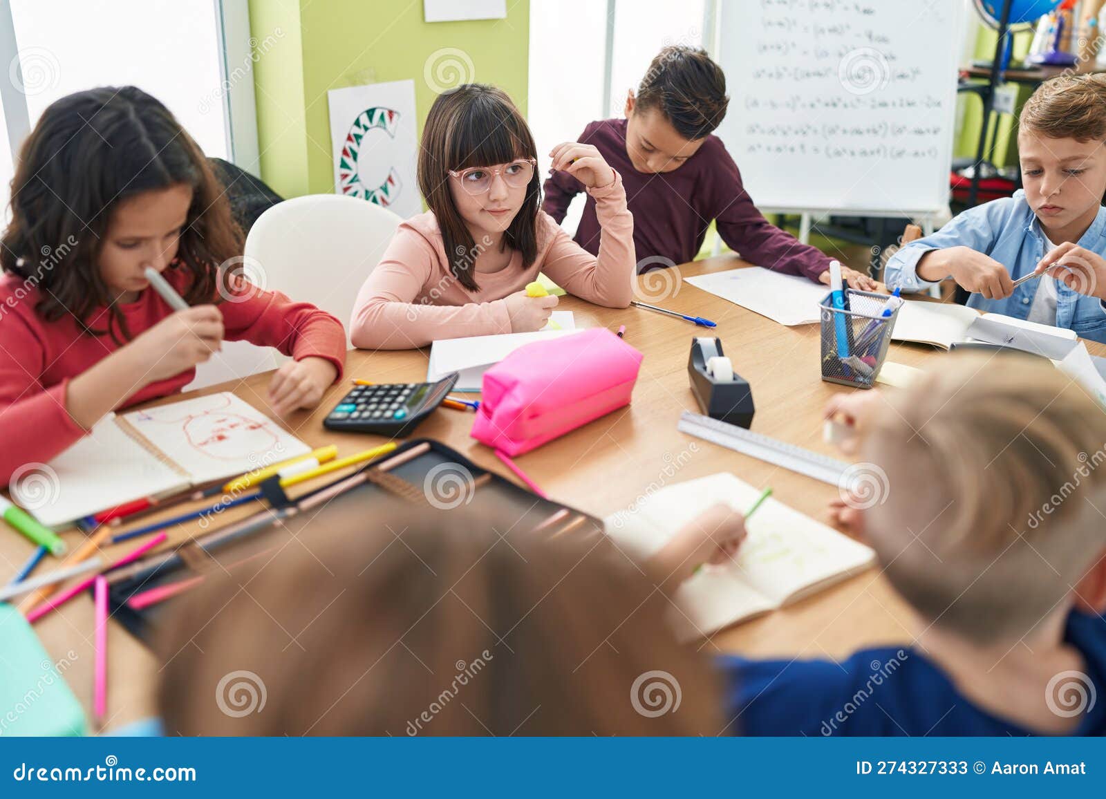 Group of Kids Students Sitting on Table Studying at Classroom Stock ...