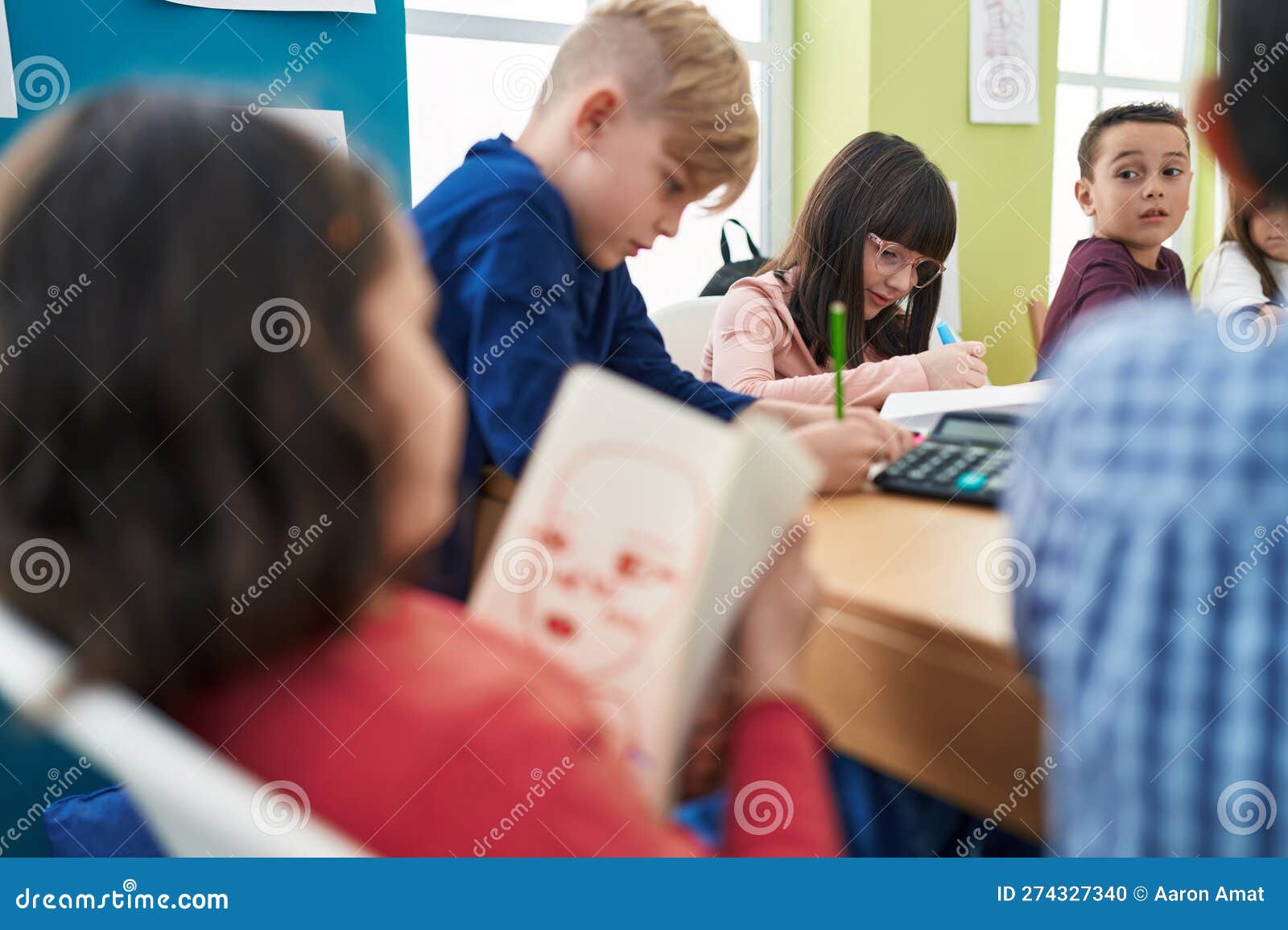 Group of Kids Students Sitting on Table Studying at Classroom Stock ...