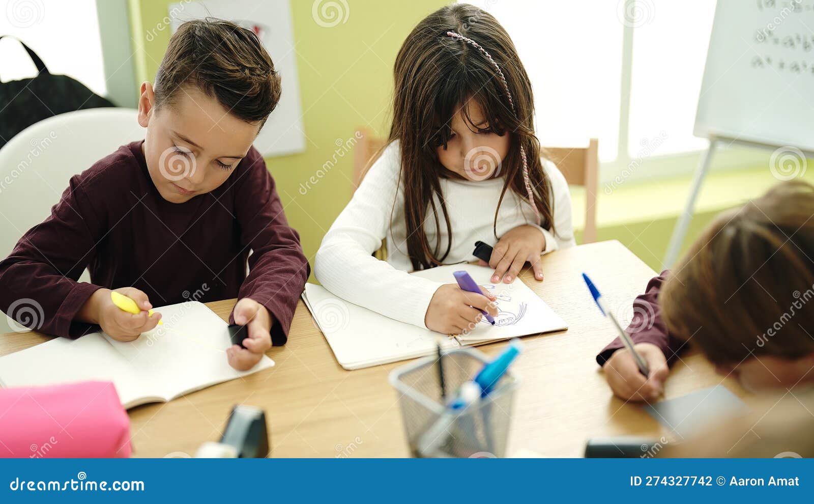 Group of Kids Students Sitting on Table Studying at Classroom Stock ...