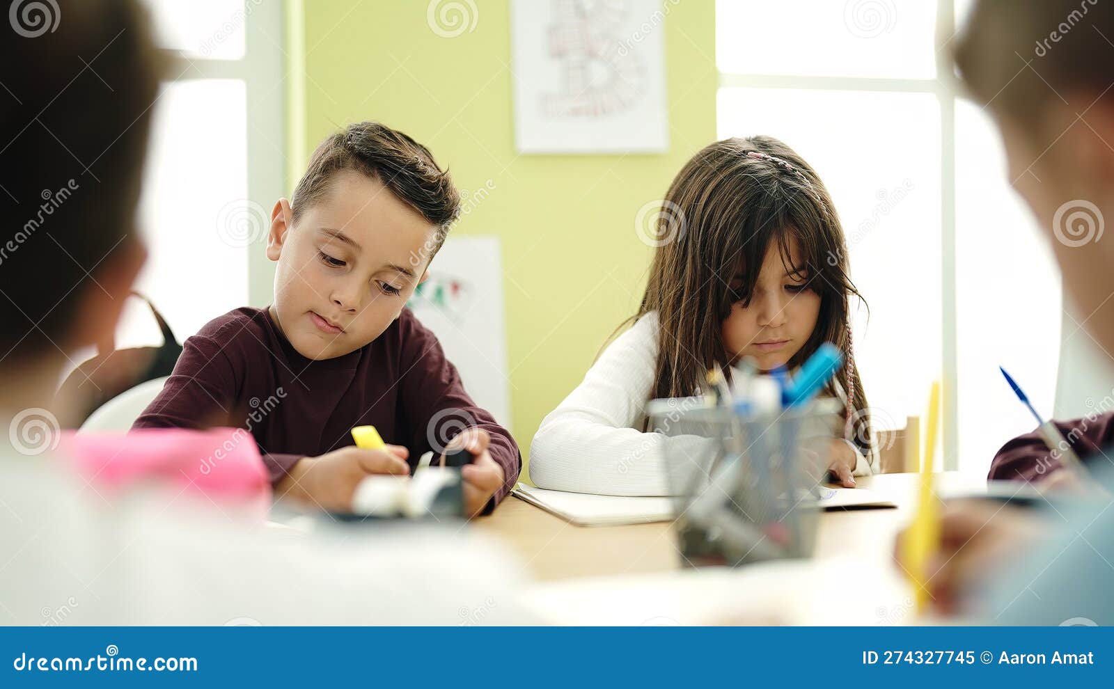 Group of Kids Students Sitting on Table Studying at Classroom Stock ...