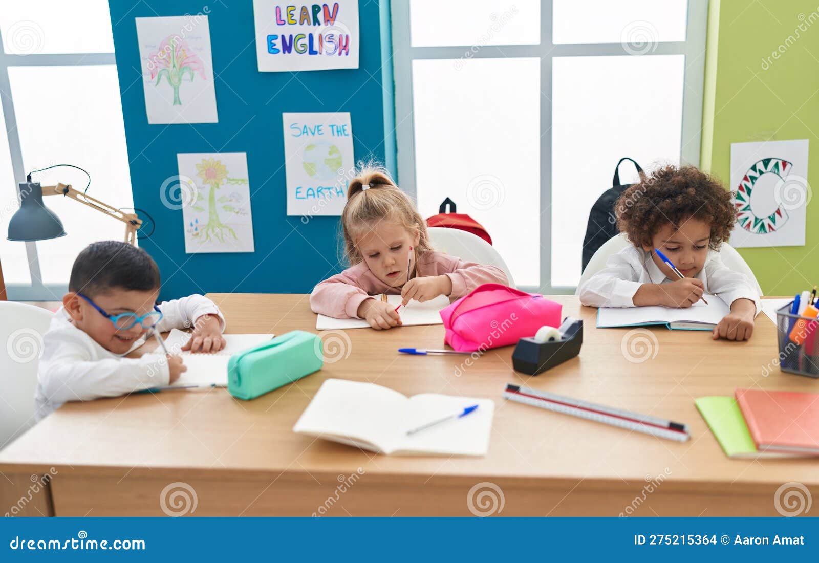 Group of Kids Students Sitting on Table Studying at Classroom Stock ...