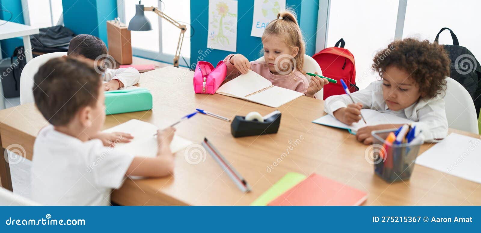 Group of Kids Students Sitting on Table Studying at Classroom Stock ...