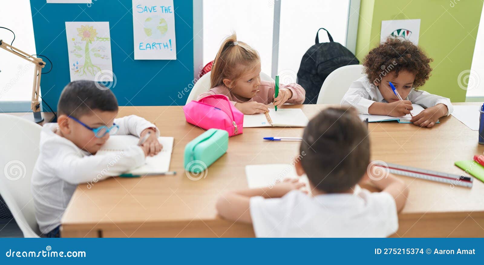 Group of Kids Students Sitting on Table Studying at Classroom Stock ...
