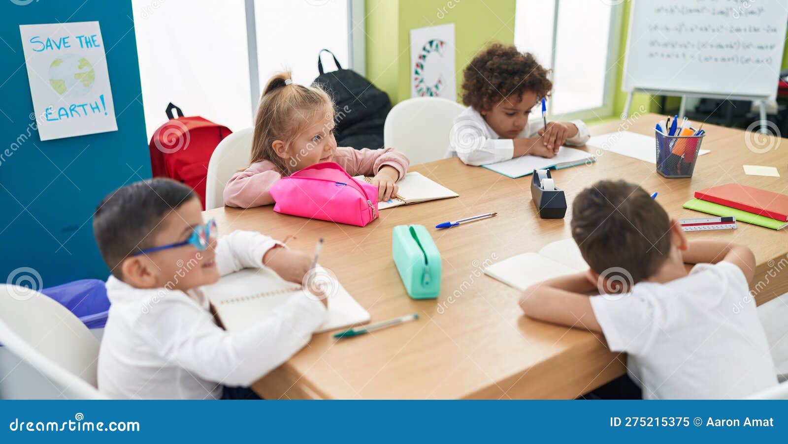 Group of Kids Students Sitting on Table Studying at Classroom Stock ...
