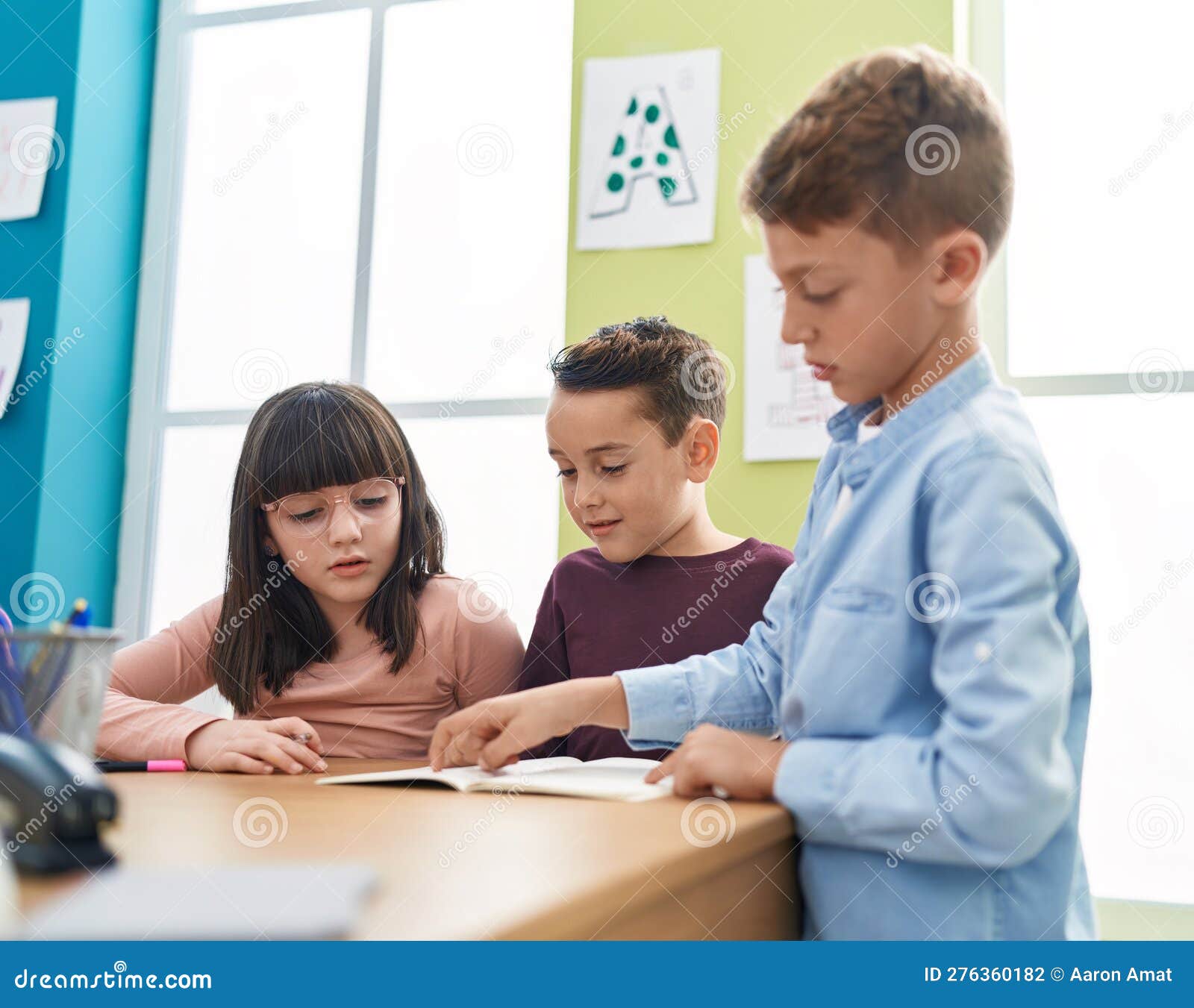 Group of Kids Students Sitting on Table Studying at Classroom Stock ...