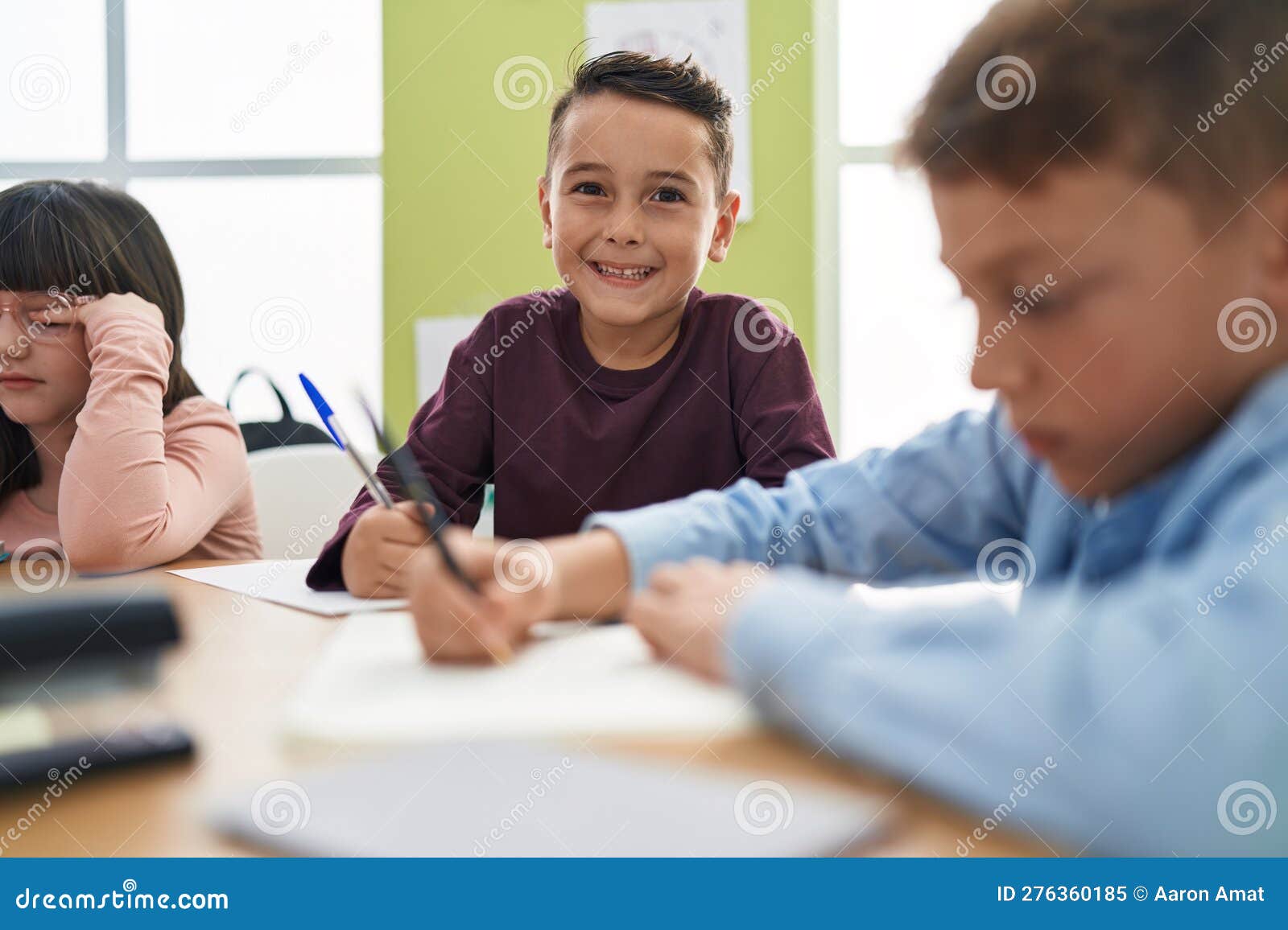Group of Kids Students Sitting on Table Studying at Classroom Stock ...