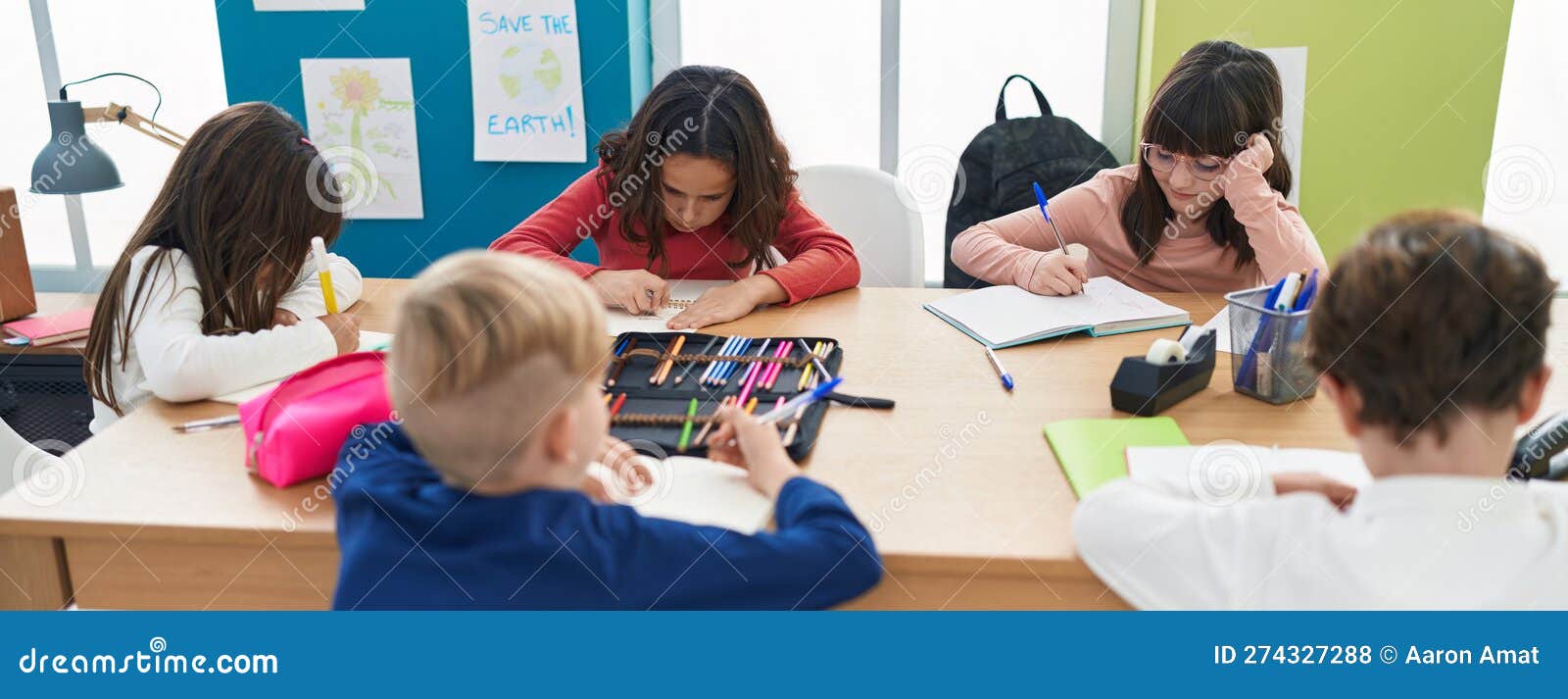 Group of Kids Students Sitting on Table Studying at Classroom Stock ...