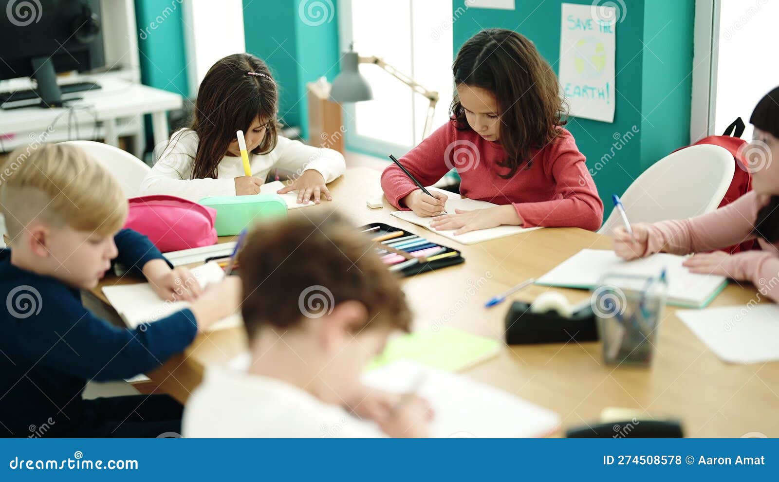 Group of Kids Students Sitting on Table Studying at Classroom Stock ...