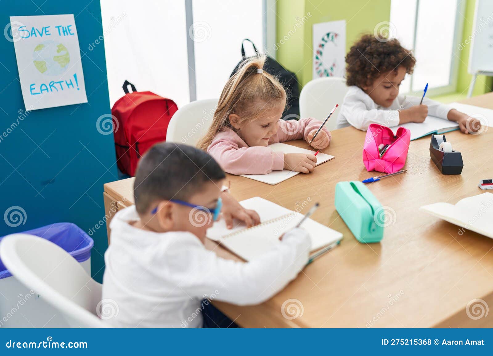 Group of Kids Students Sitting on Table Studying at Classroom Stock ...