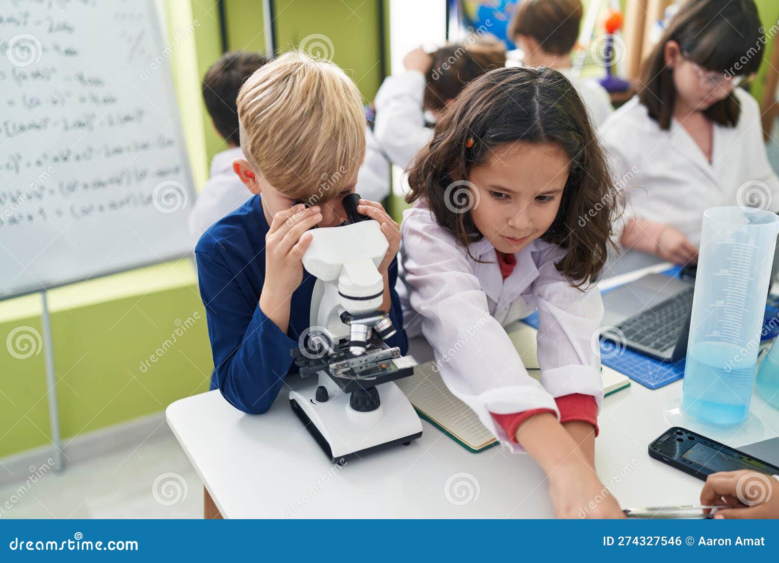 Group of Kids Students Using Microscope at Laboratory Classroom Stock ...