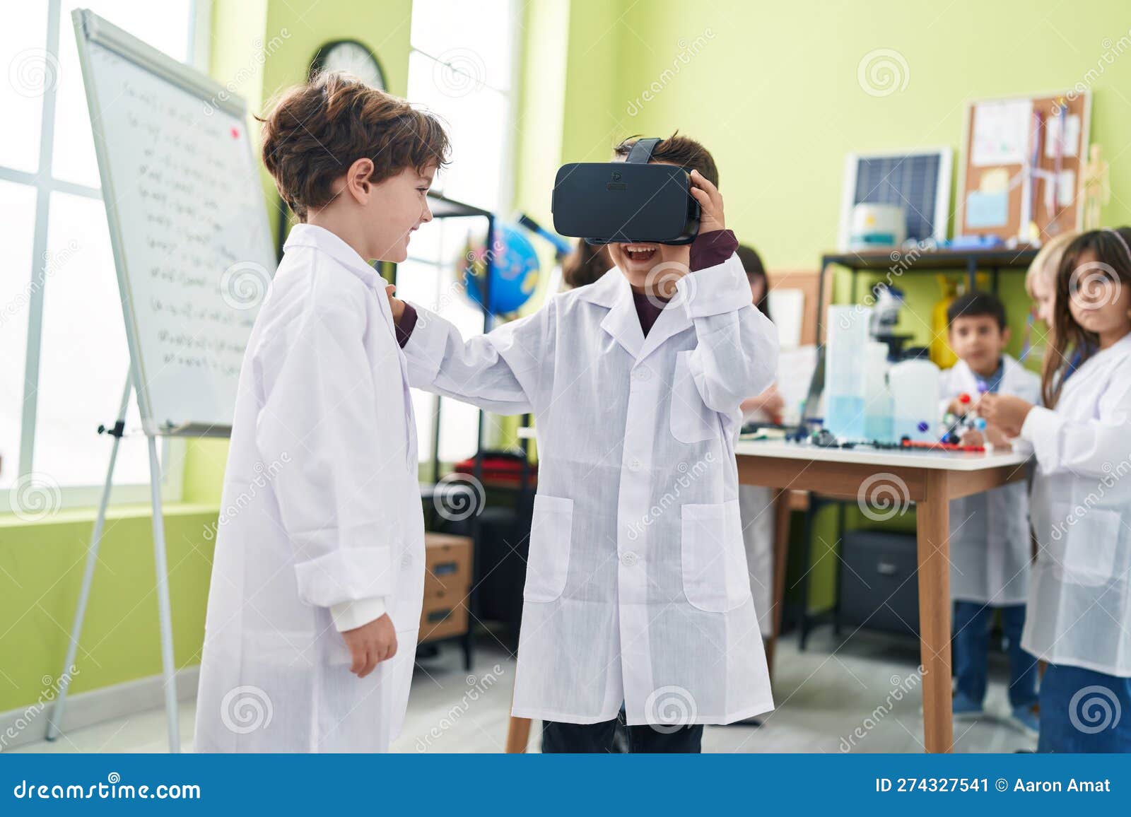 Group of Kids Students Using Virtual Reality Glasses at Laboratory ...