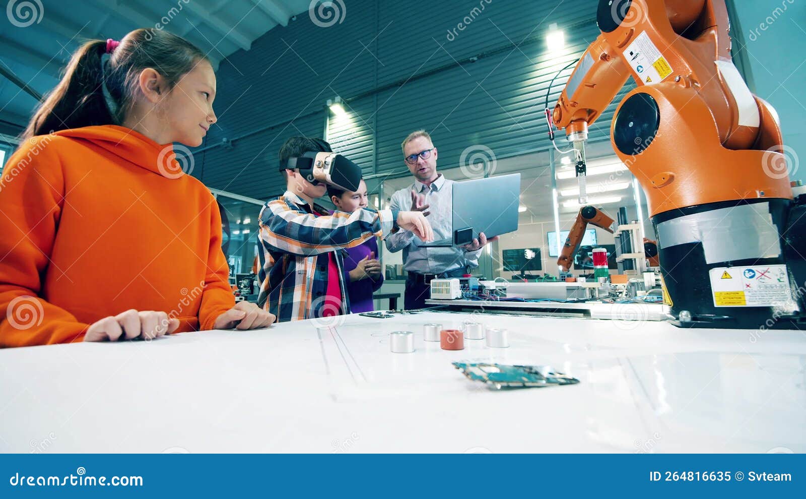 A Group of Kids are Studying Robotics through Virtual Reality. Stock ...