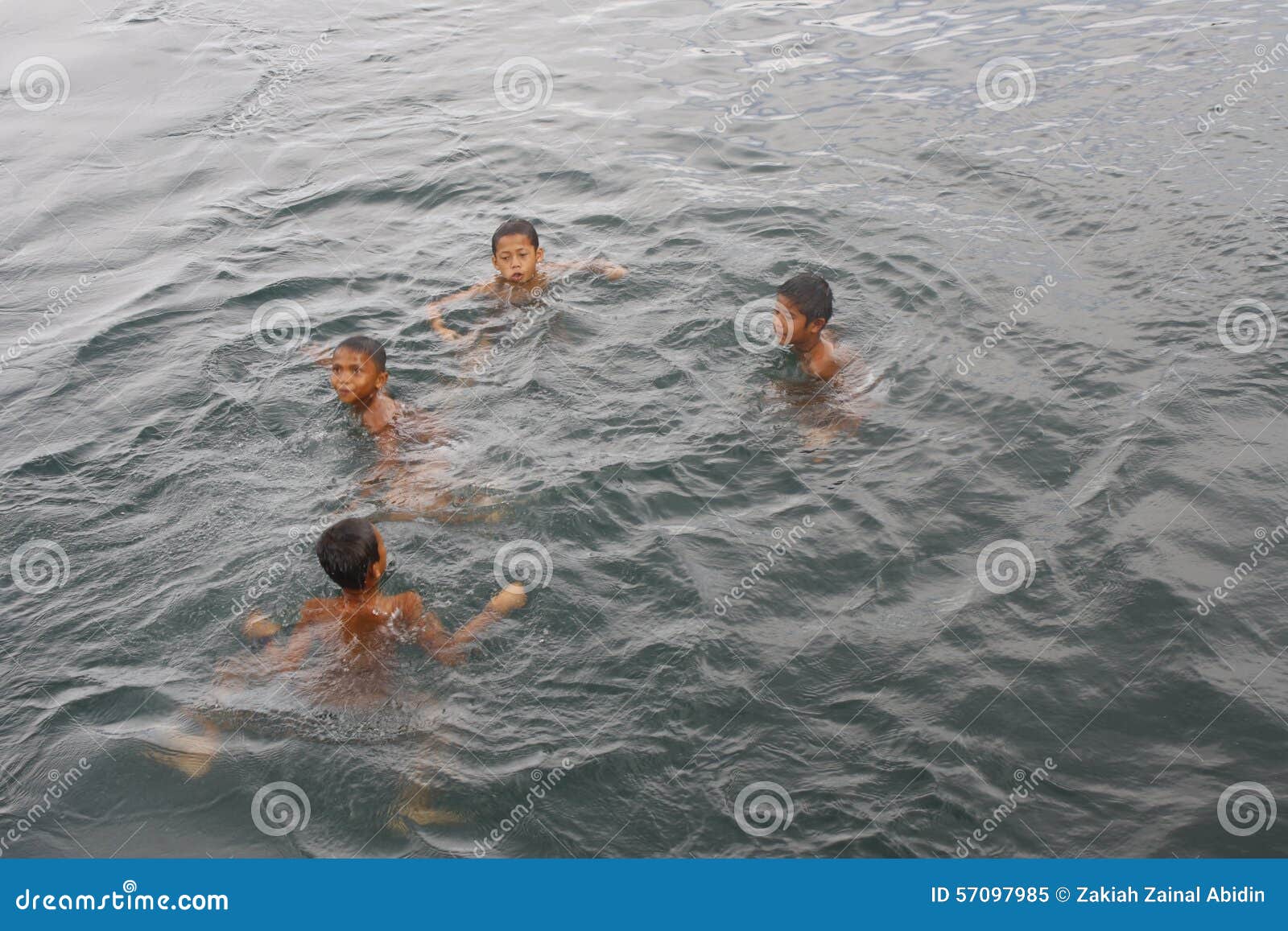 A Group of Kids Swimming in a Lake Editorial Image - Image of lake ...
