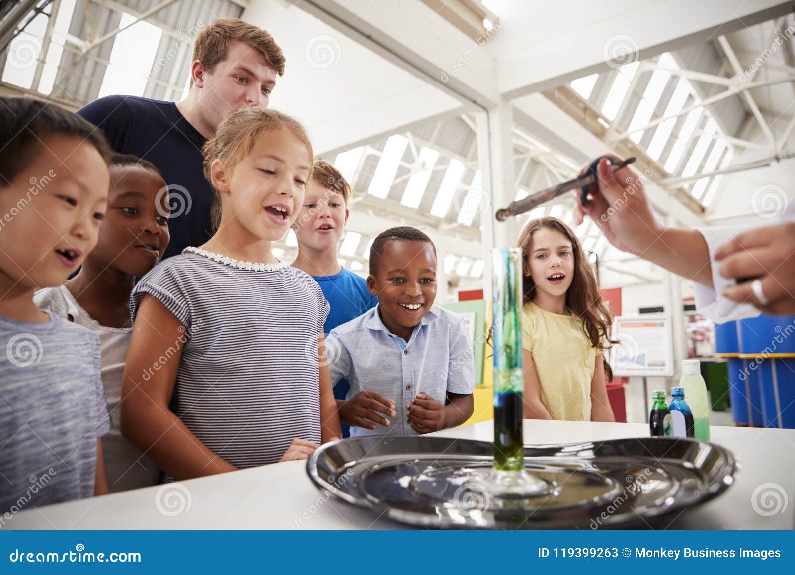 Group of Kids and Teachers Carrying Out a Science Experiment Stock ...