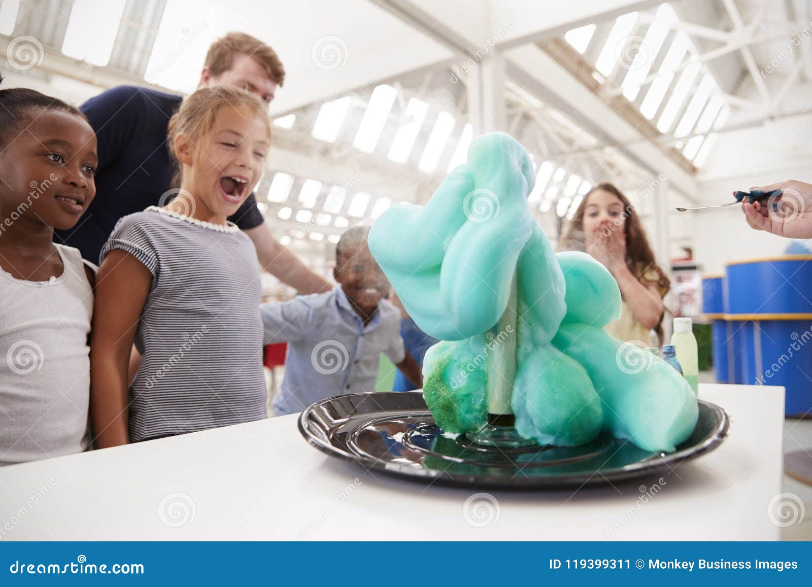 Group of Kids and Teachers Carrying Out a Science Experiment Stock ...