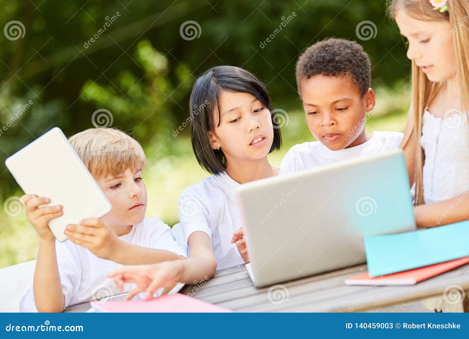 Group of Kids in Teamwork at Laptop Computer Stock Image - Image of ...