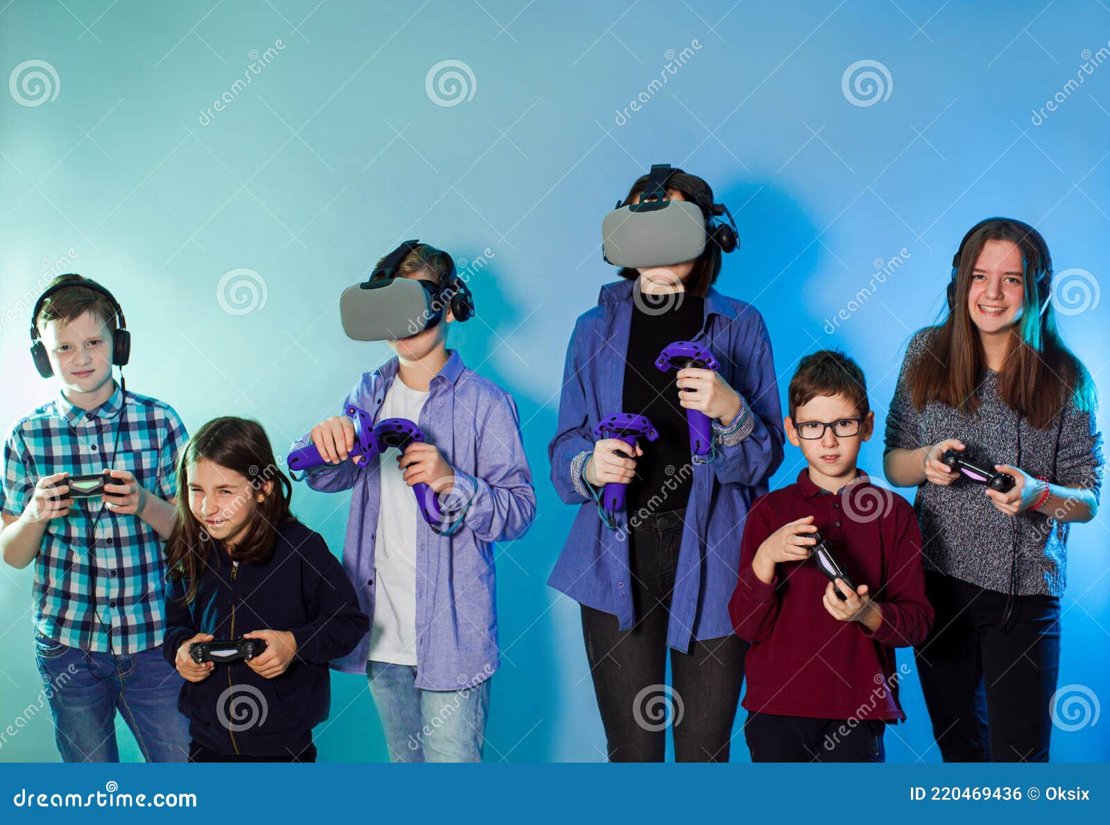 Group of Kids Using a Gaming Gadgets for Virtual Reality Stock Photo ...