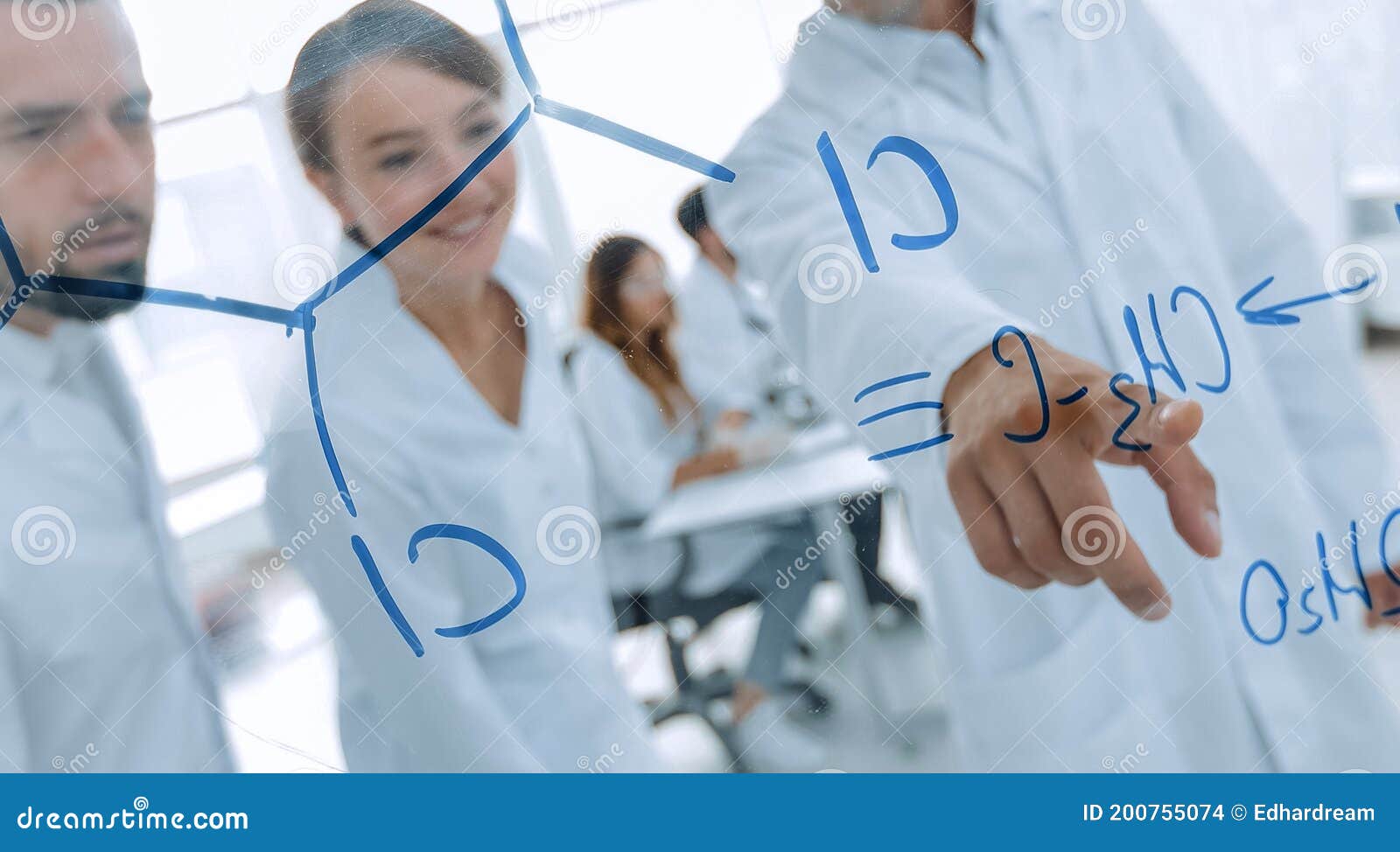 Group of Laboratory Scientists Discussing Their Research in the Stock ...