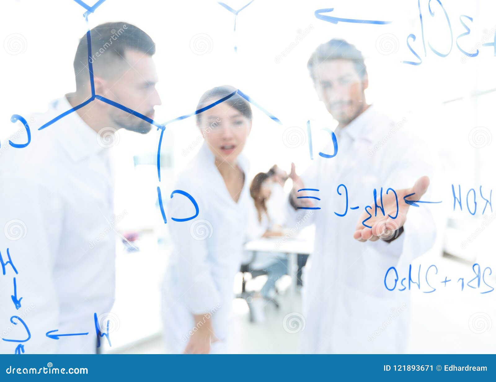 Group of Laboratory Scientists Discussing Their Research in the ...